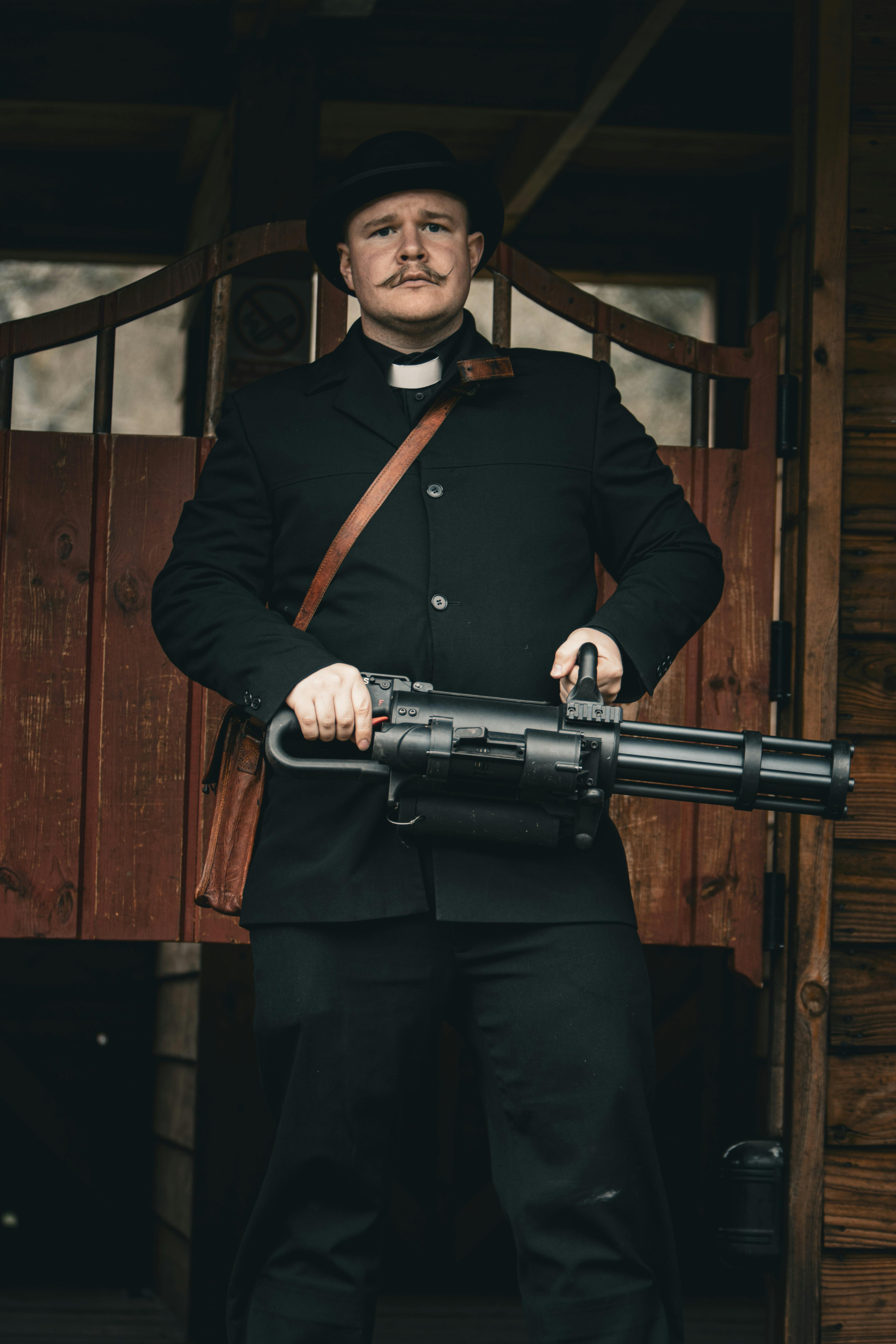 Gangster Holding Machine Gun · Free Stock Photo