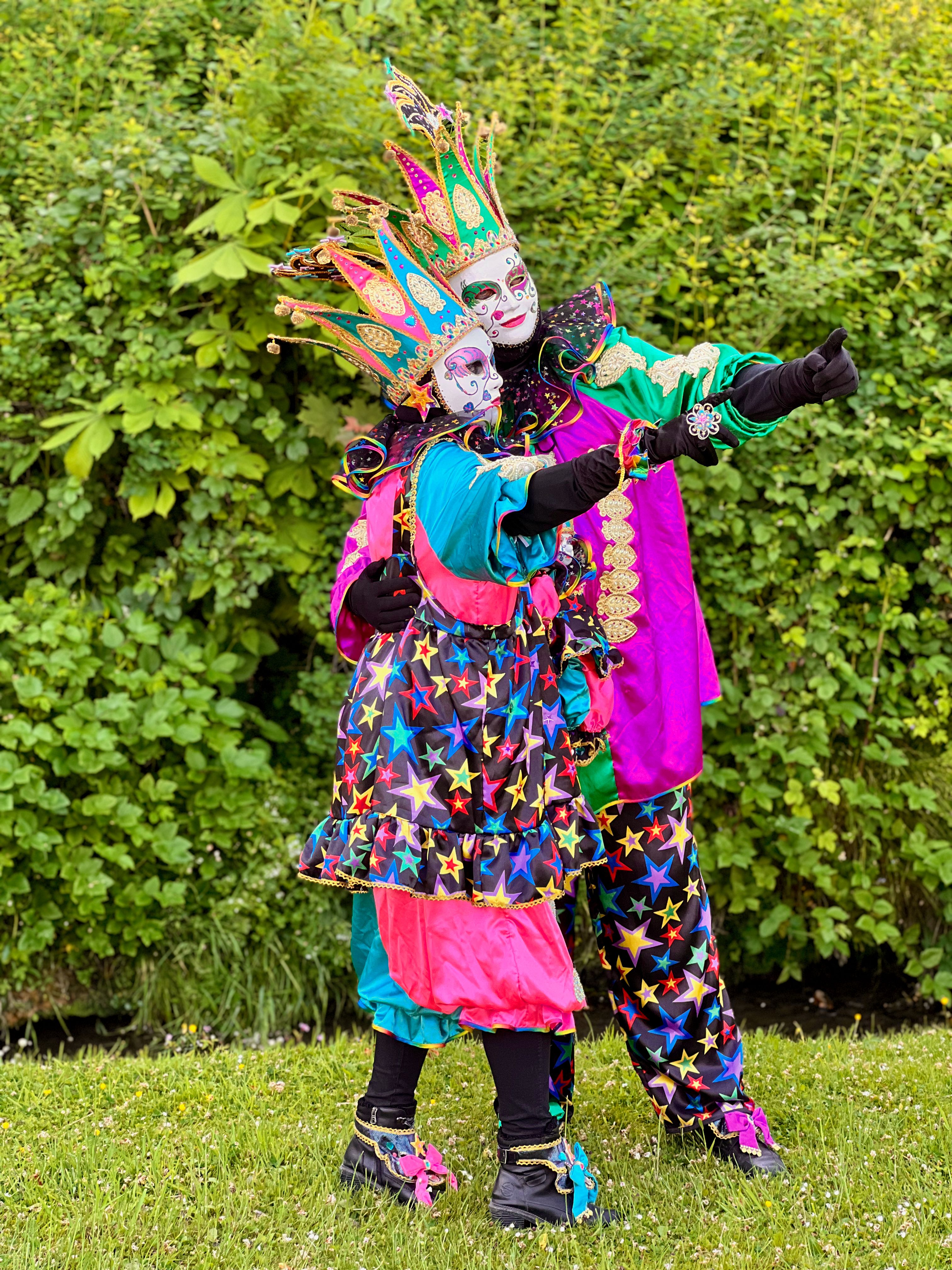 Couple in Colorful Carnival Costumes · Free Stock Photo