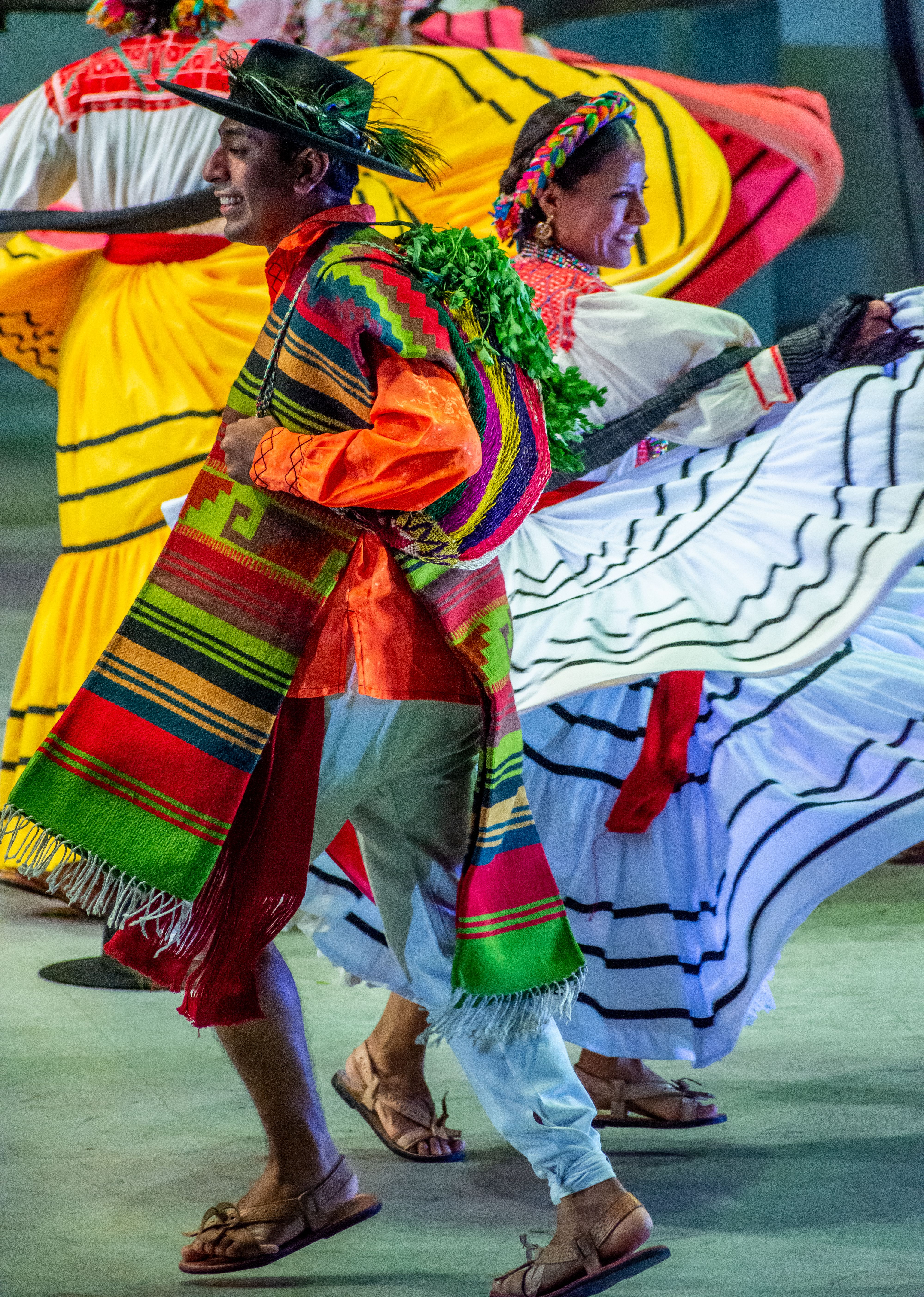A group of people in colorful clothing dancing · Free Stock Photo