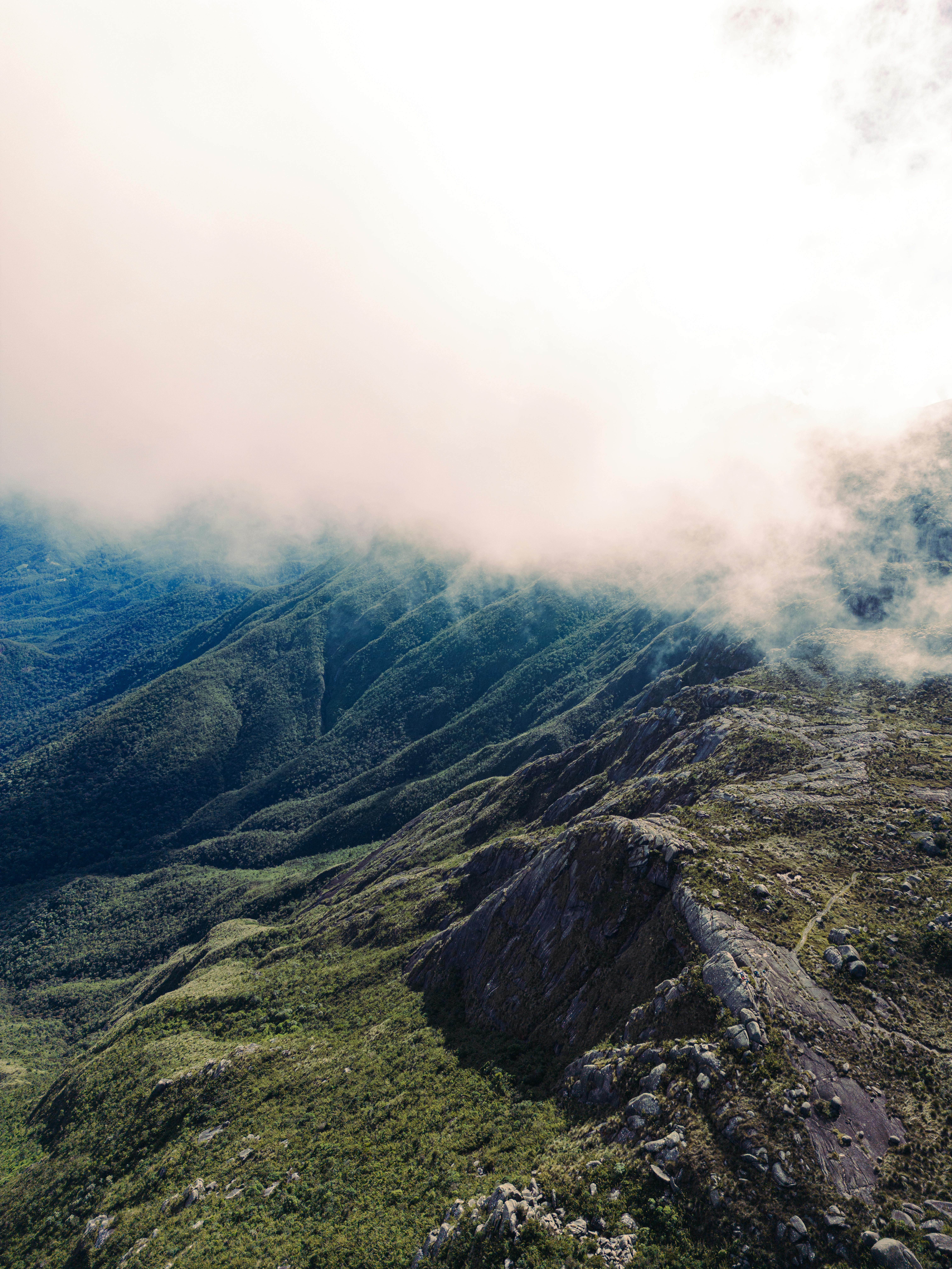 Clouds over Mountains Ridge · Free Stock Photo