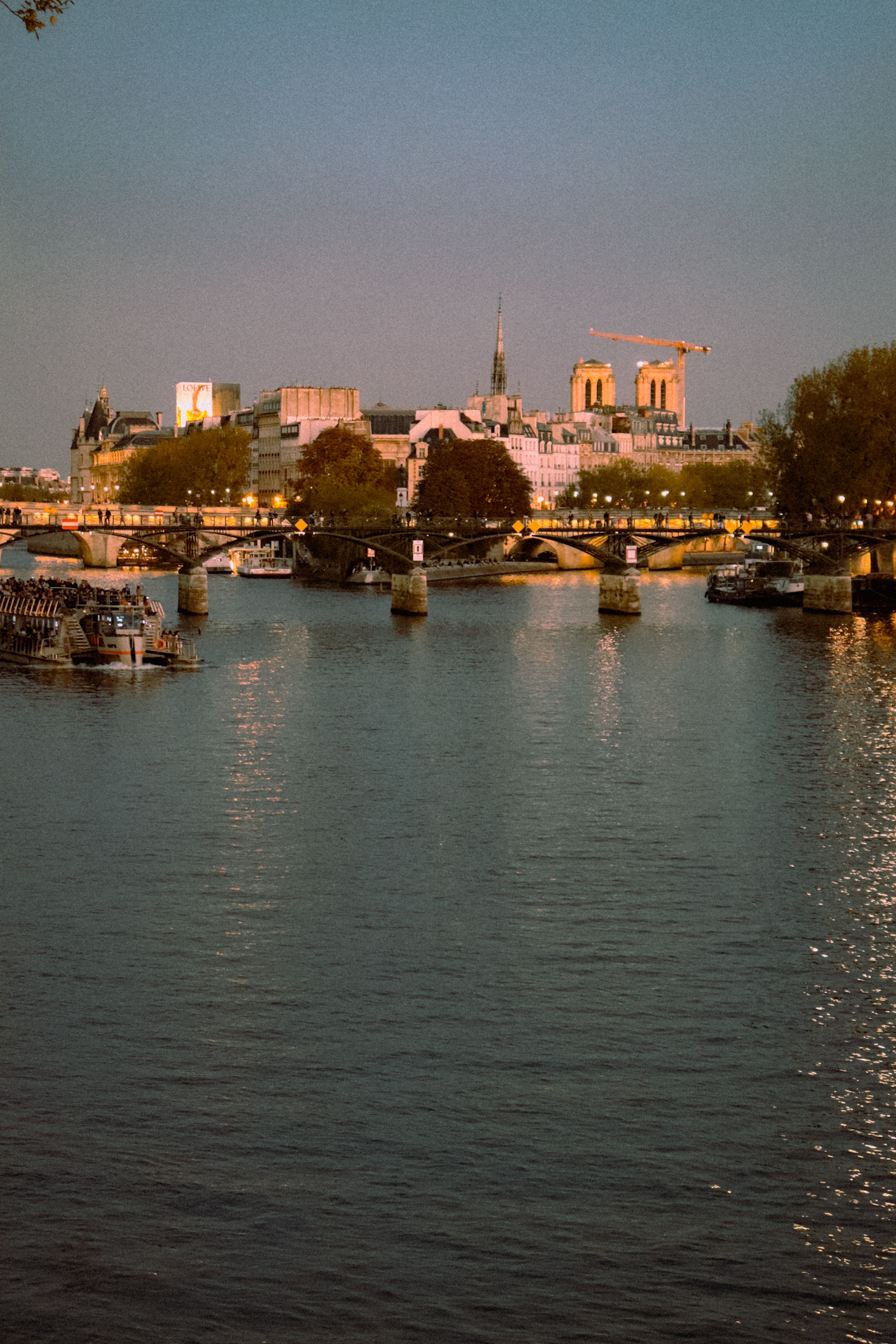 A view of the seine river and buildings in paris · Free Stock Photo