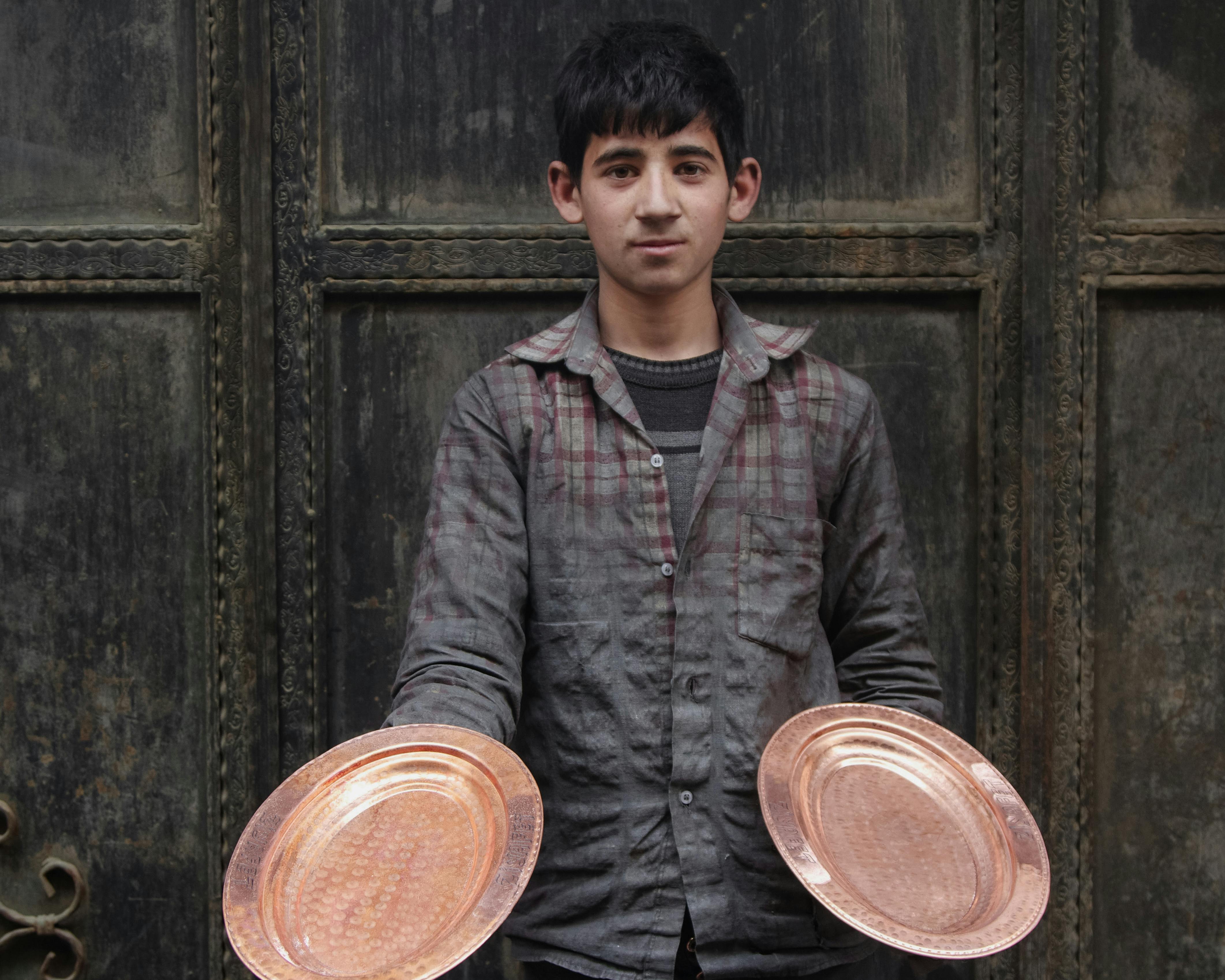 Man Making Decorative Plates · Free Stock Photo