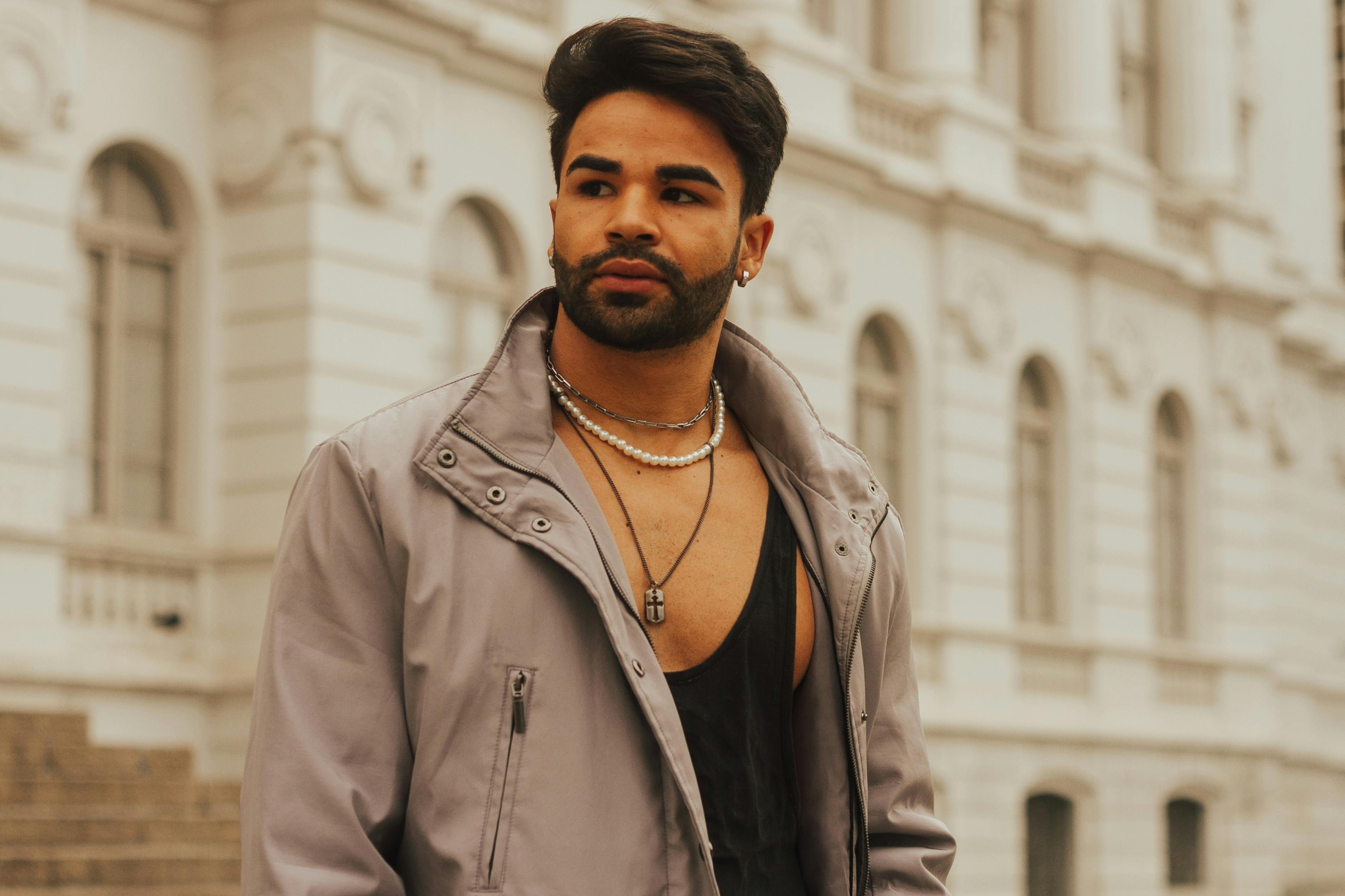 Young Woman in Black Tank Top and Bomber Jacket Posing in a Subway ...