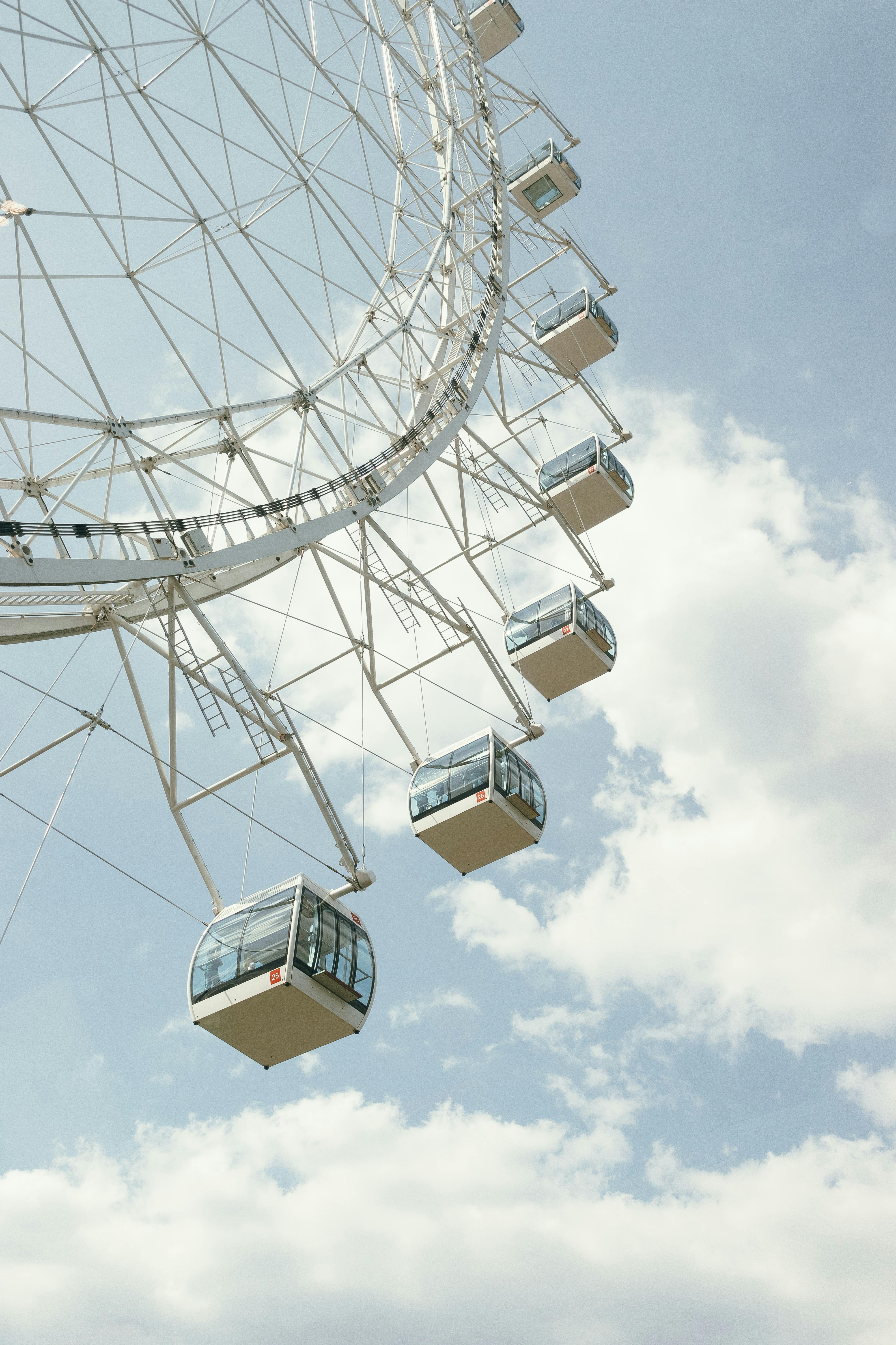Carts of a Ferris Wheel Against the Sky · Free Stock Photo