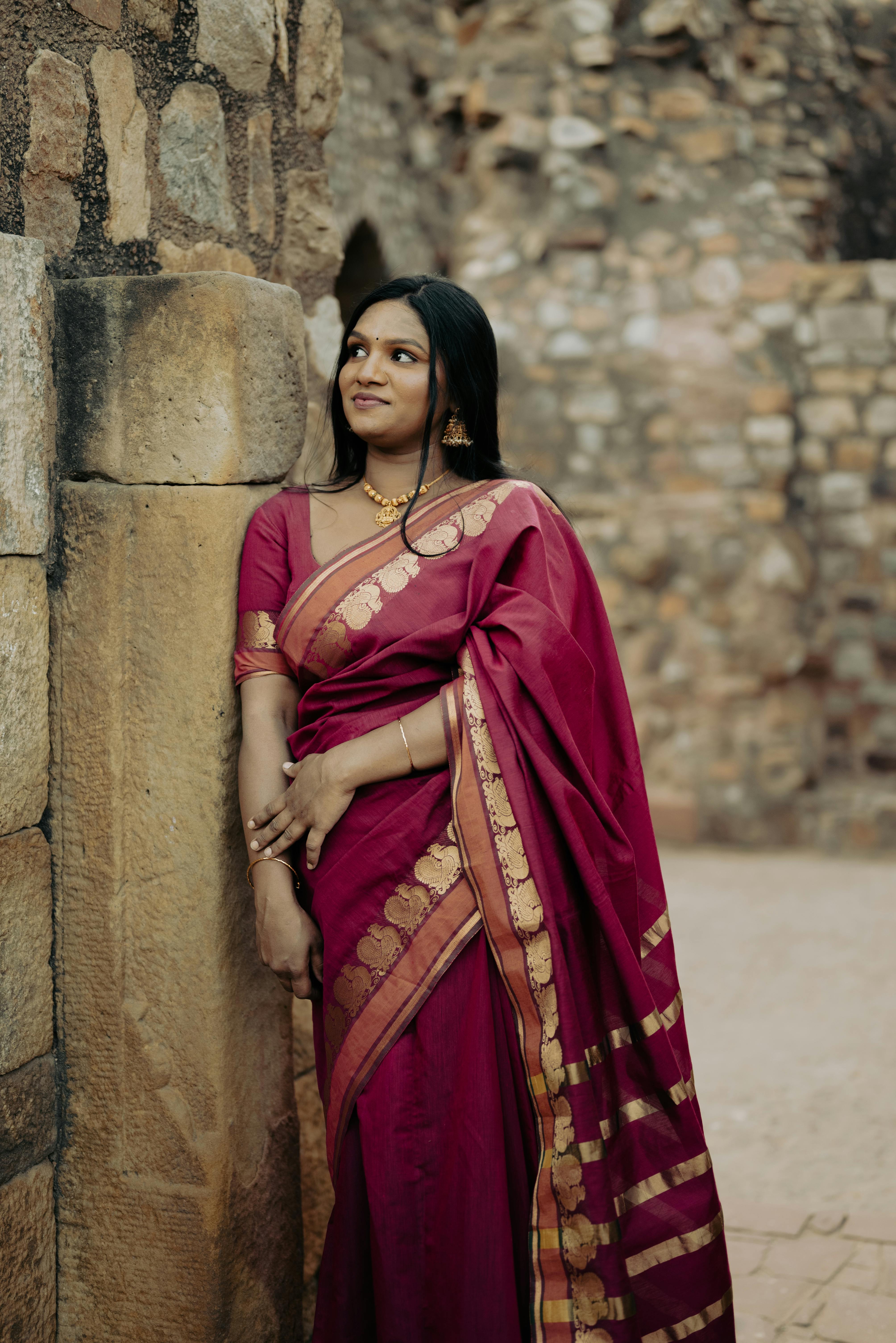 Woman in Red and Gold Sari Wearing a Veil · Free Stock Photo
