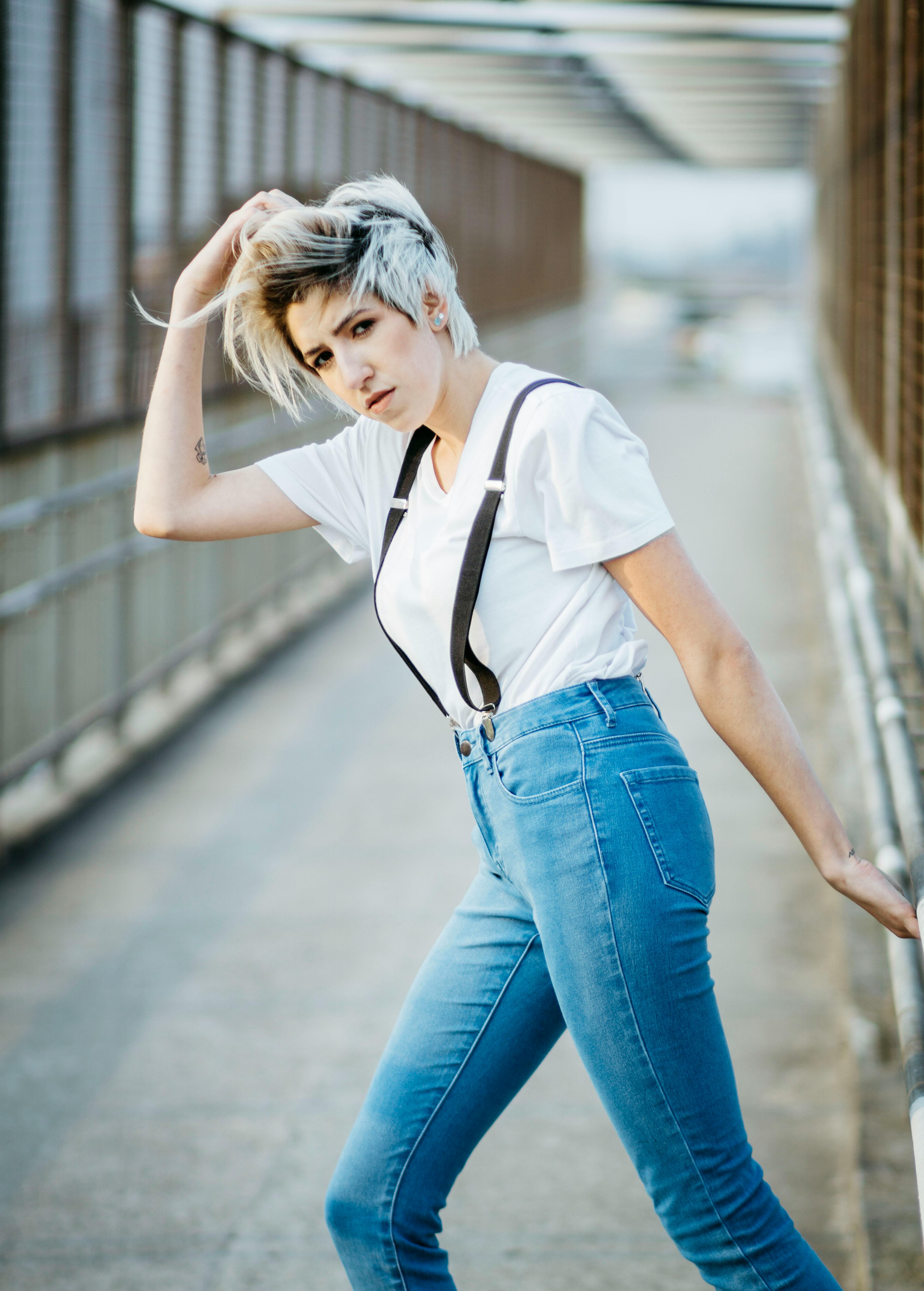 Model Wearing Suspenders to Jeans · Free Stock Photo