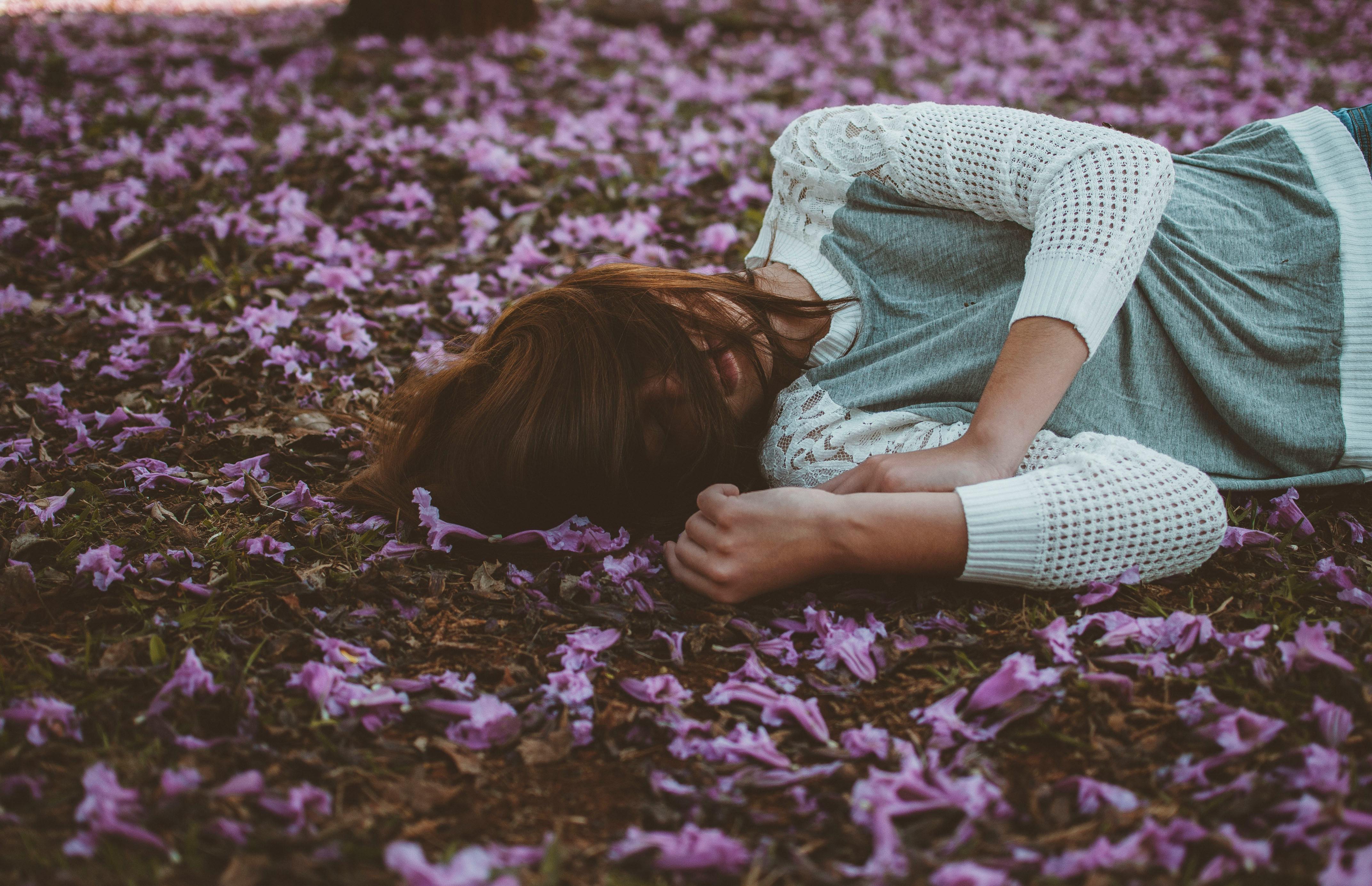 Woman Relaxing among Flowers · Free Stock Photo