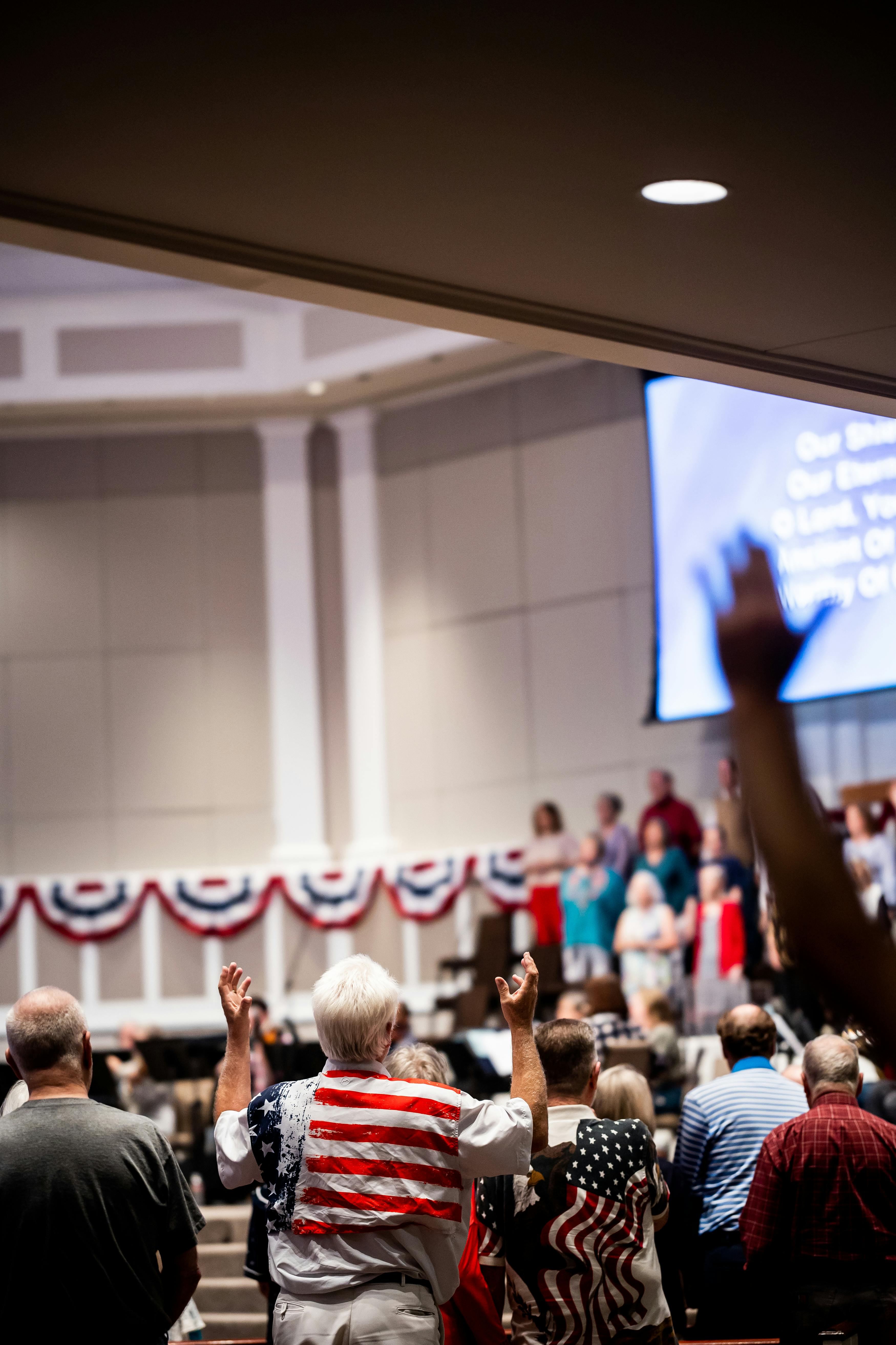 People Praying during Mass · Free Stock Photo