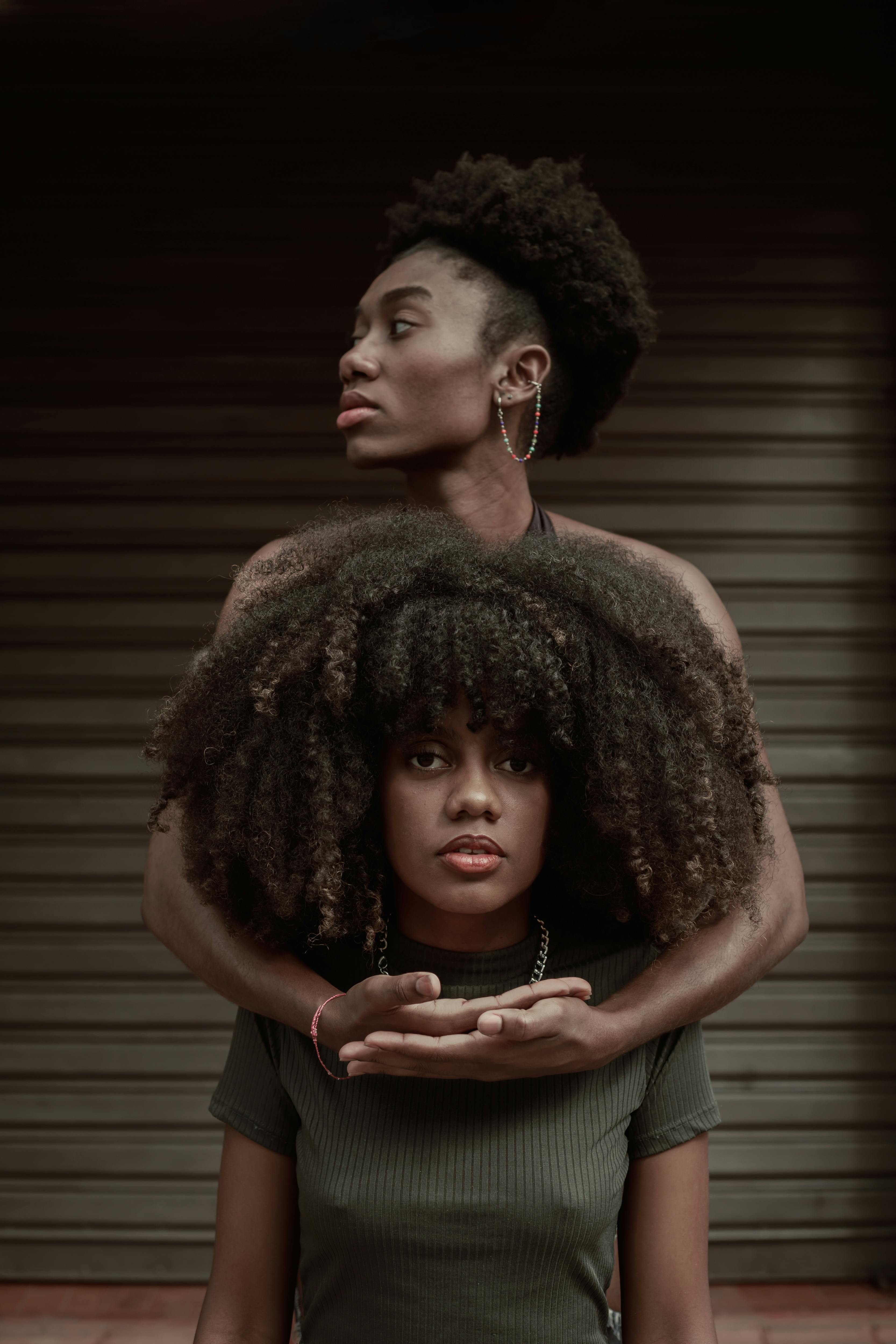 Two Women with Afro Hair · Free Stock Photo