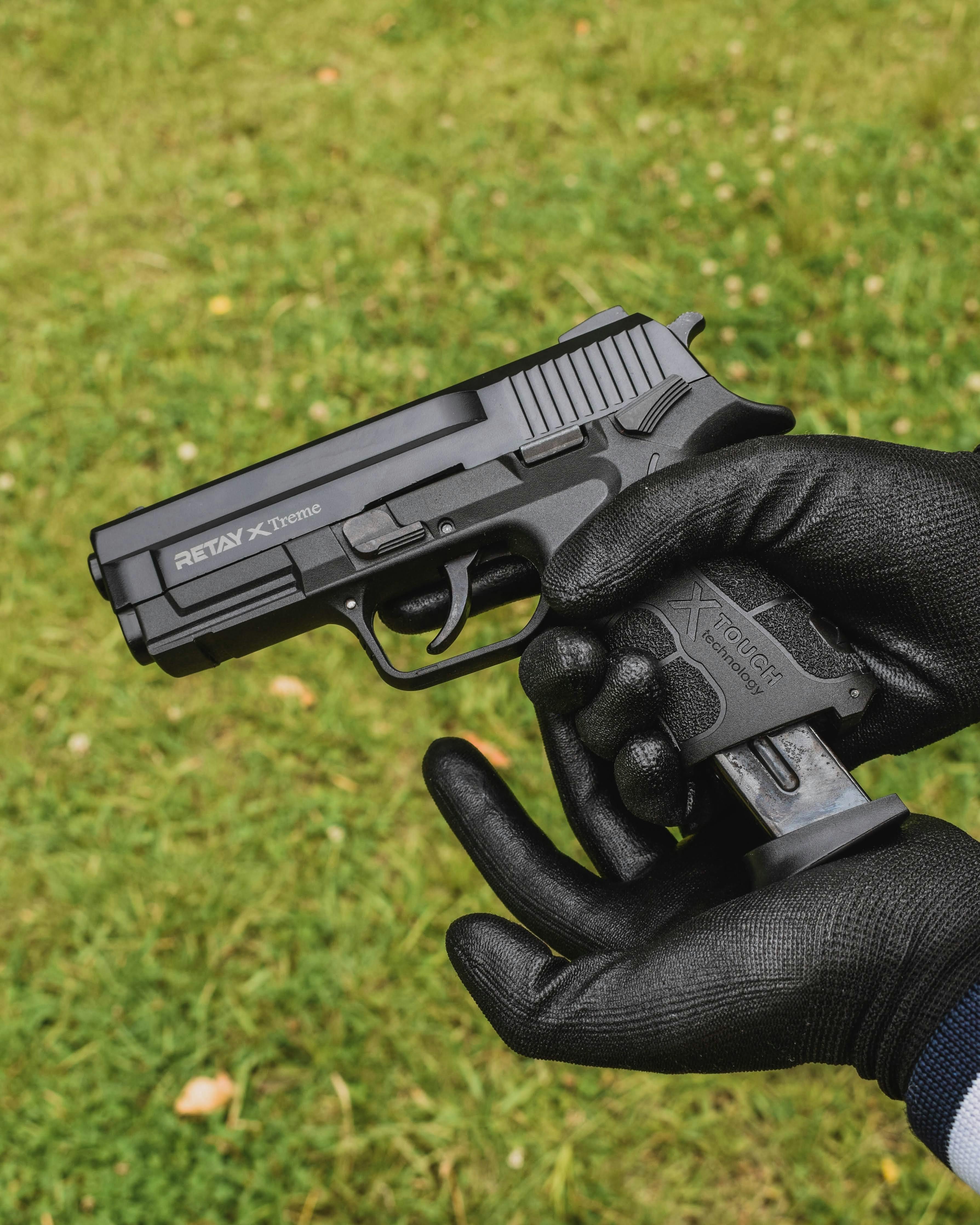 Man Pointing a Gun · Free Stock Photo