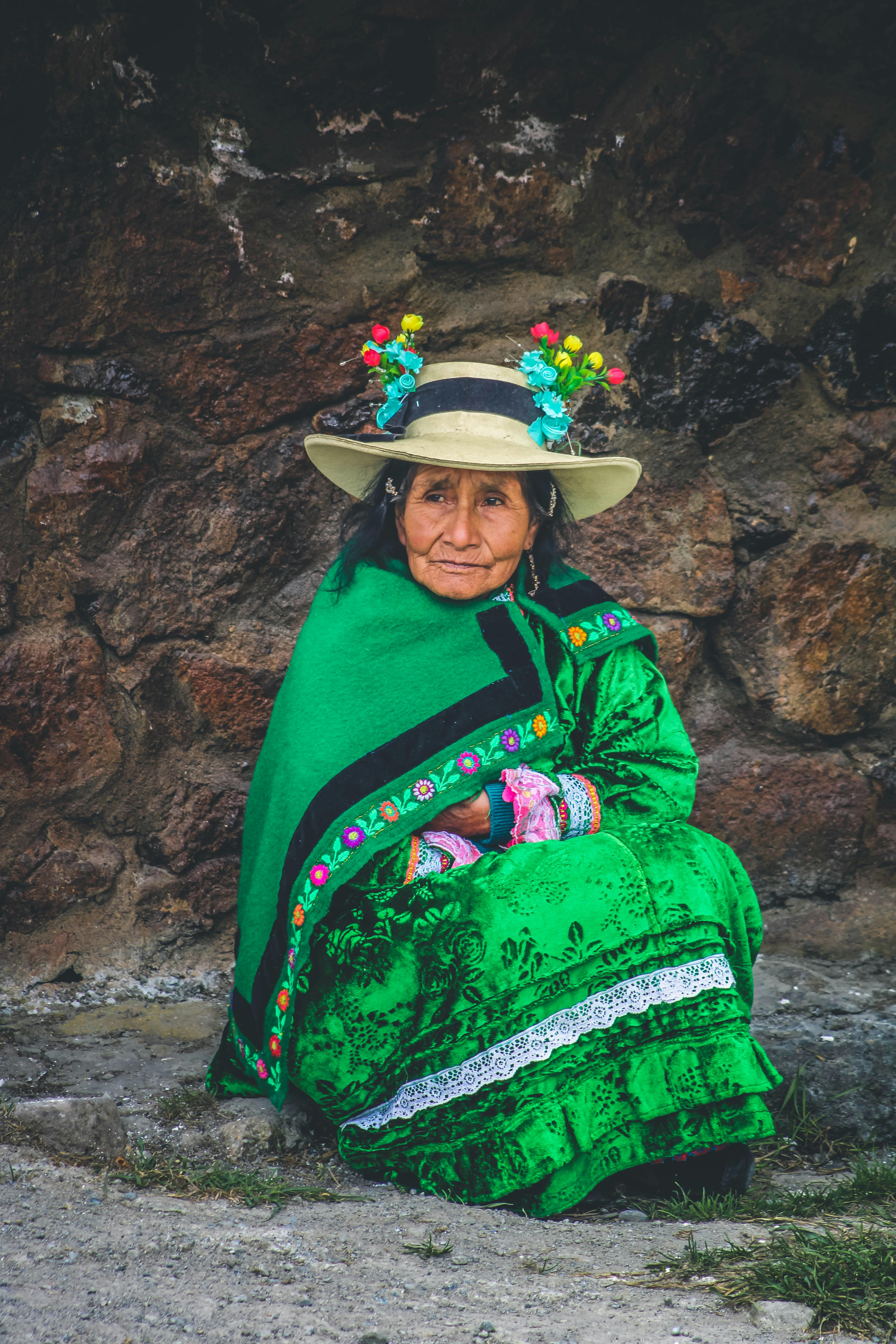 Woman in Green Traditional Peruvian Dress · Free Stock Photo