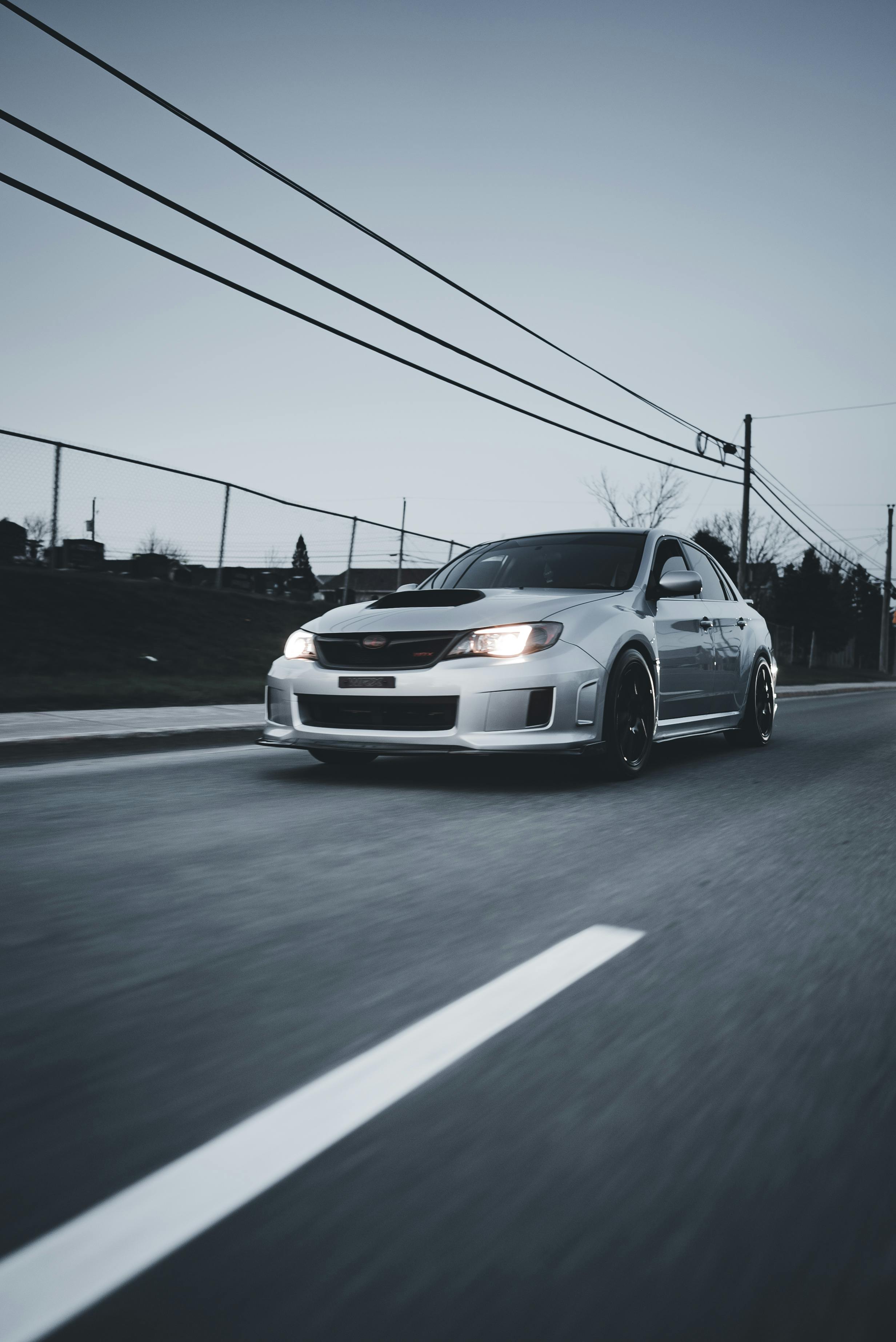 Silver Subaru Impreza WRX Running on Road · Free Stock Photo