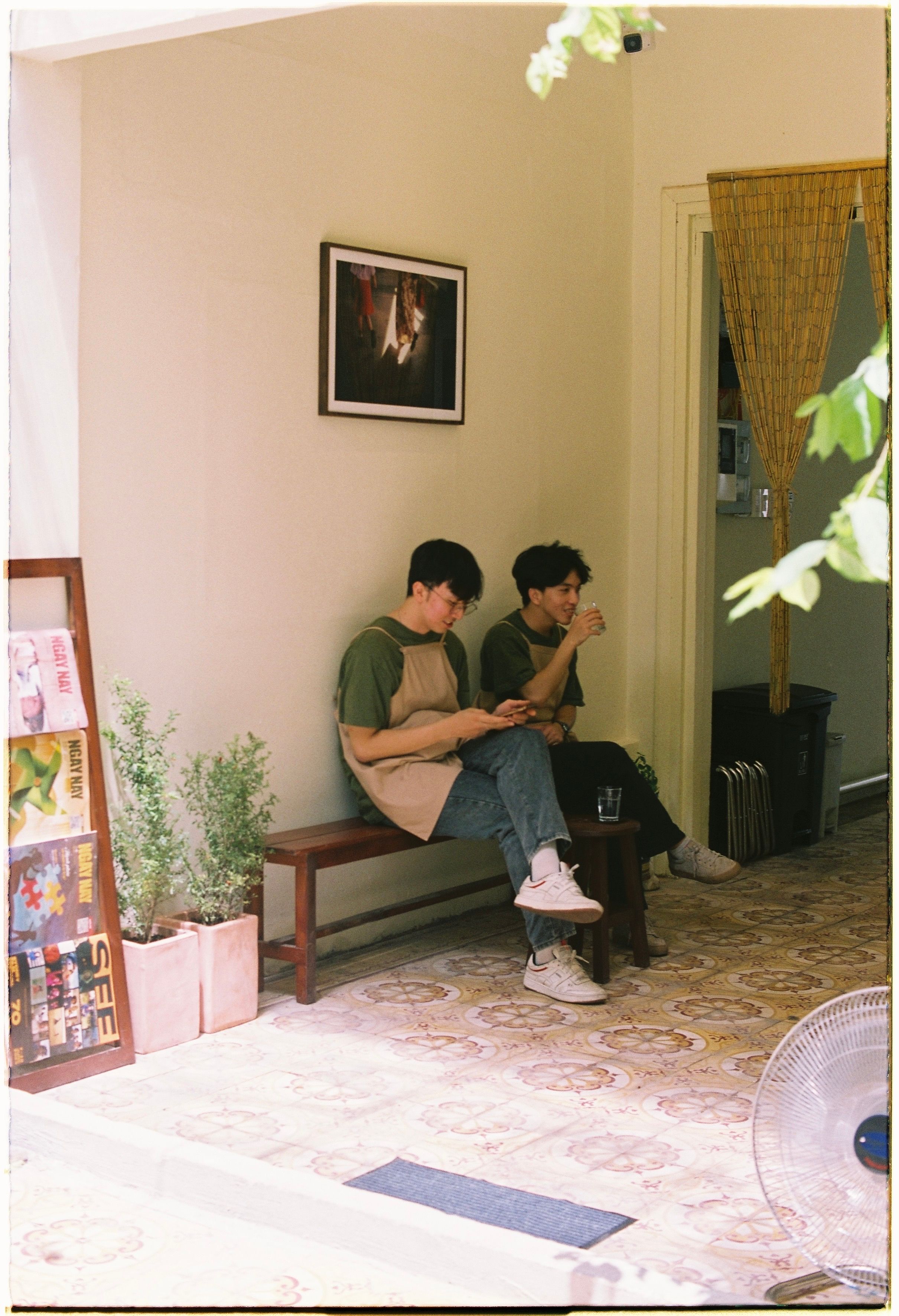 Two Young Baristas Sitting on a Bench during the Break at Work · Free ...