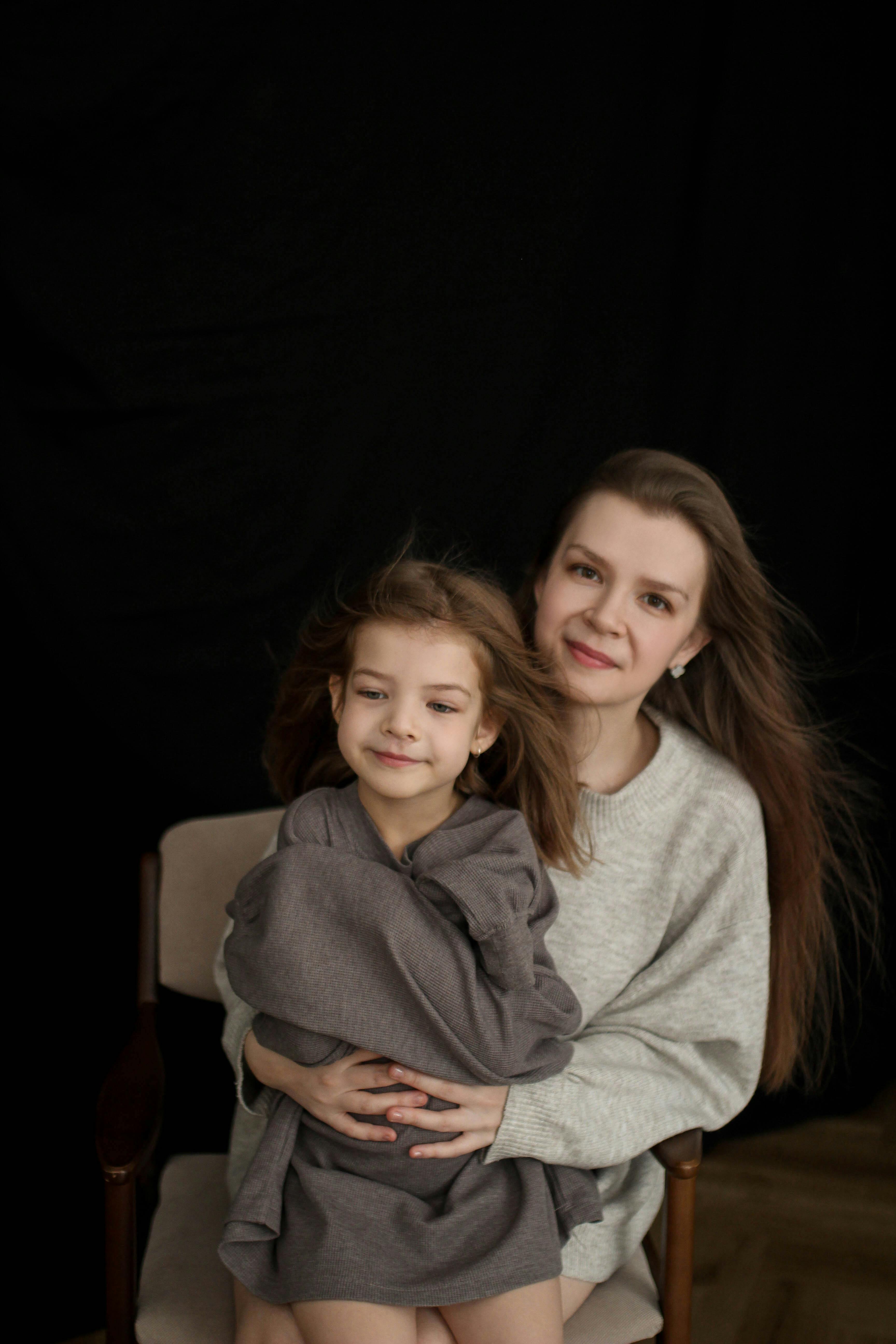 Portrait of a Woman with her Daughter · Free Stock Photo