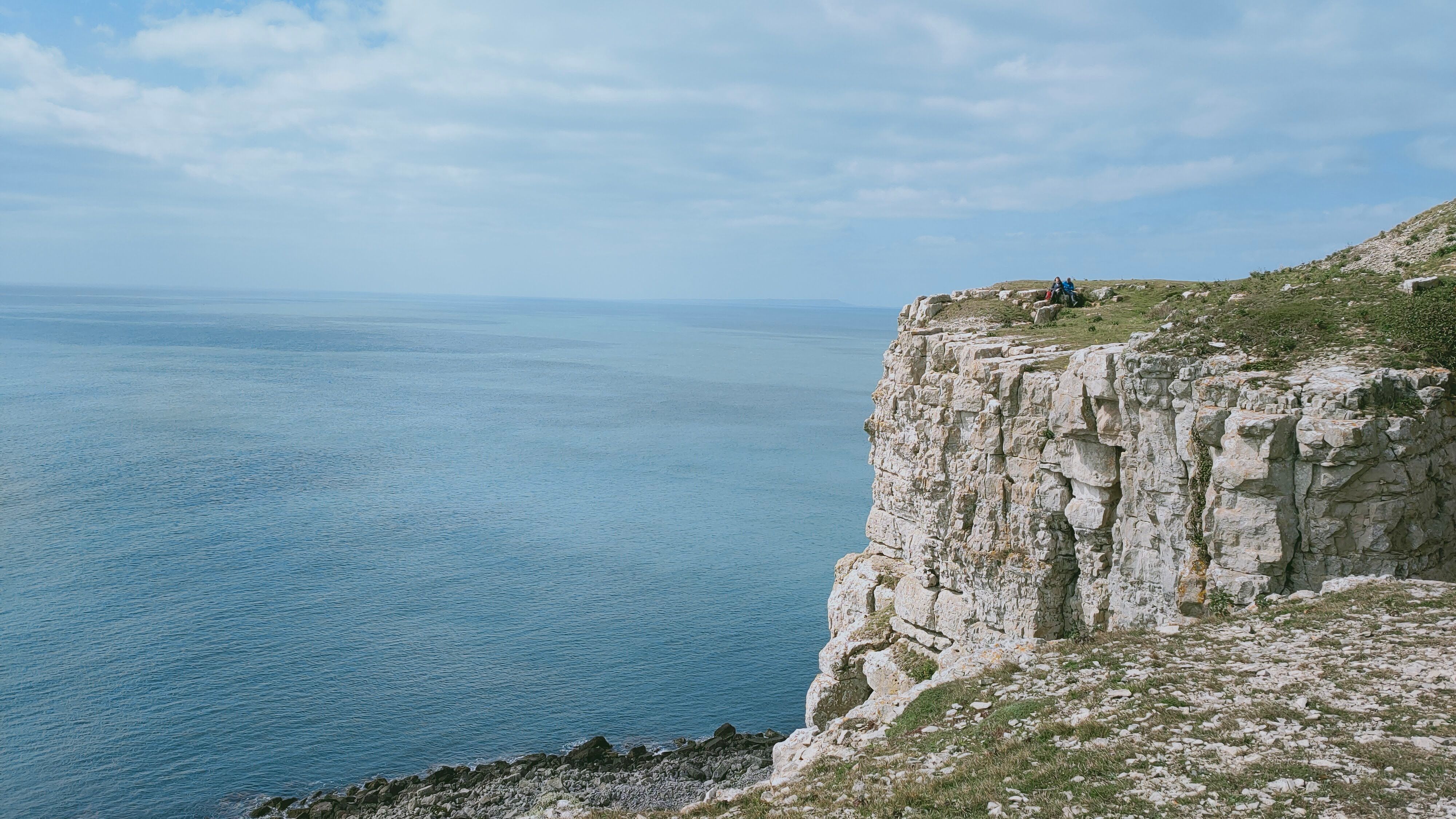 A Rocky Cliff by the Sea · Free Stock Photo