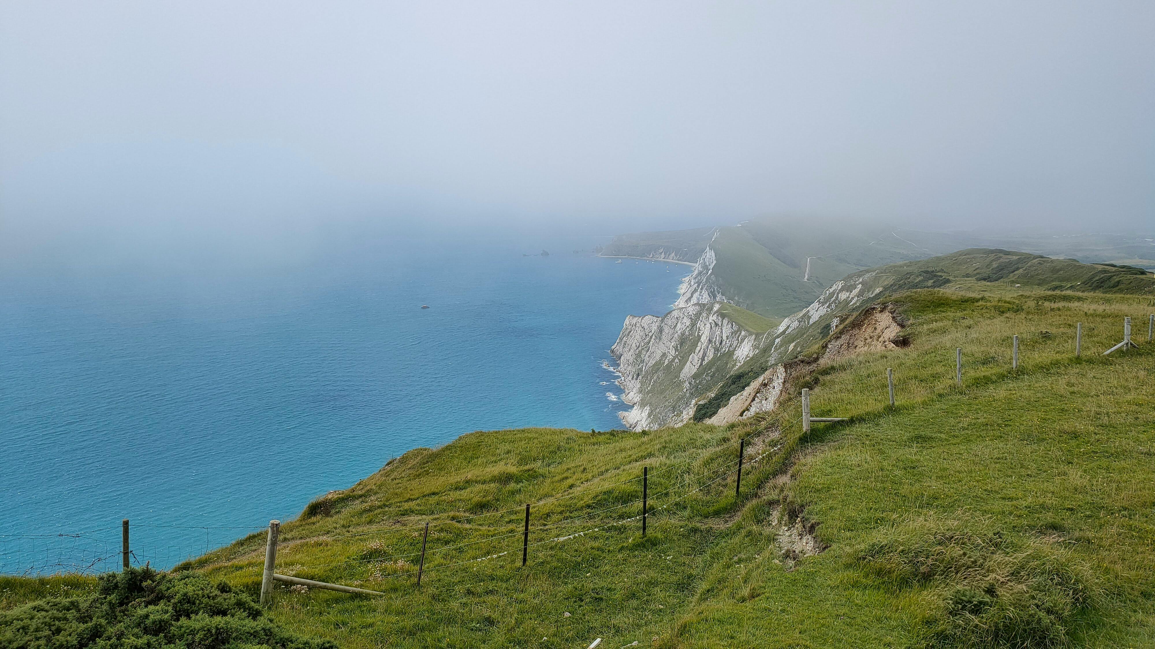 House on Cliff near Sea · Free Stock Photo