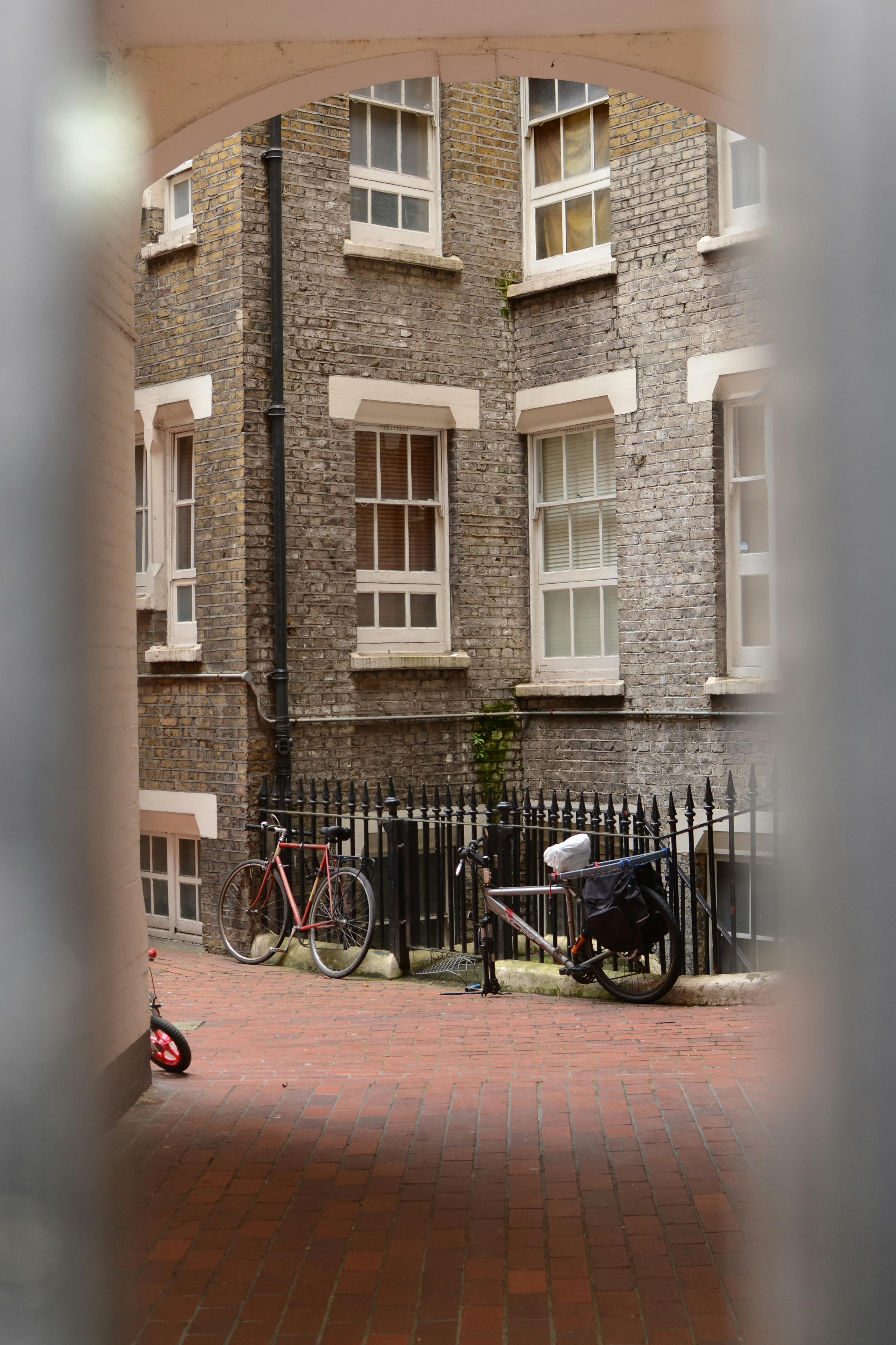 Black Wall of Building by Street · Free Stock Photo