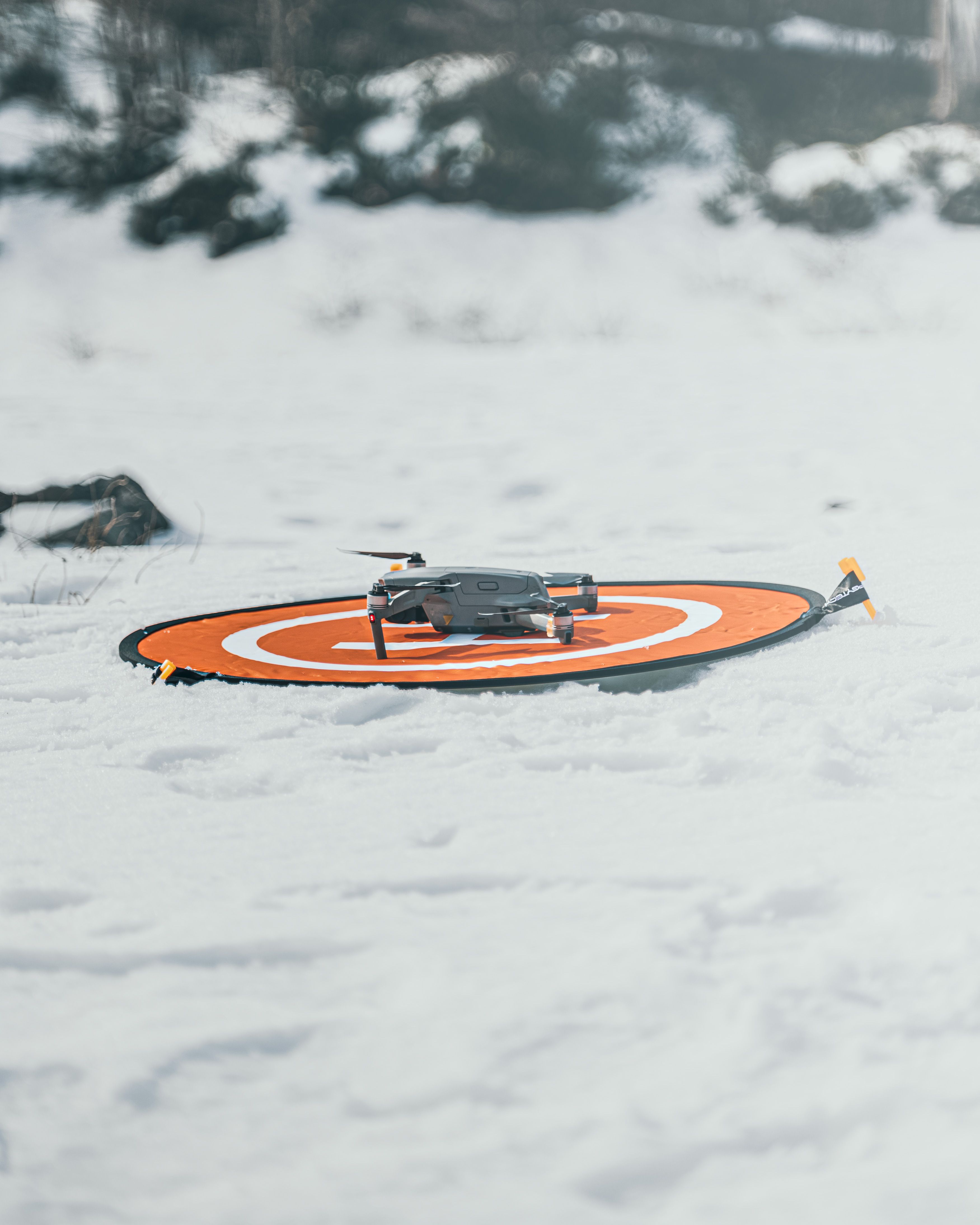 Drone on Landing Pad in Snow · Free Stock Photo