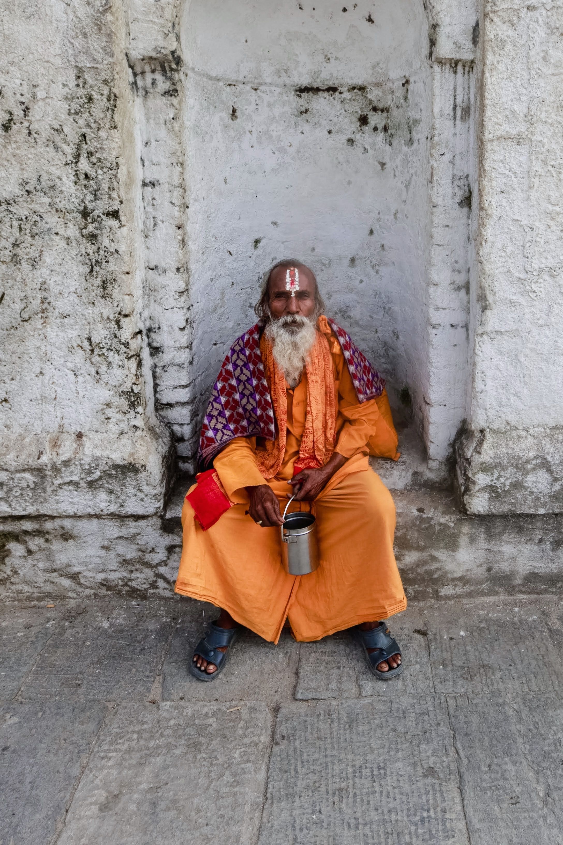 Portrait of a Sadhu Sitting Outdoors · Free Stock Photo