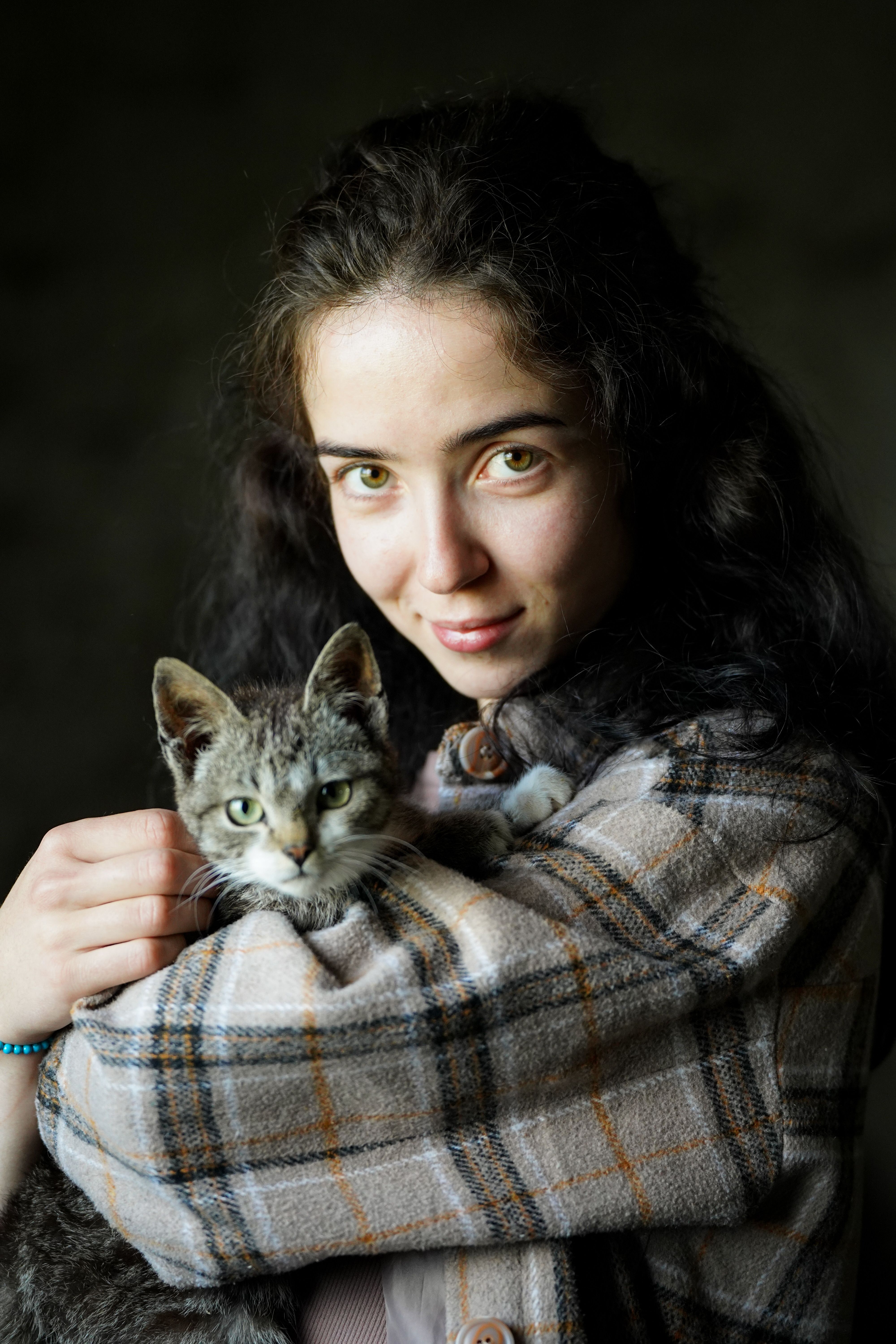 A Girl Holding a Cat · Free Stock Photo