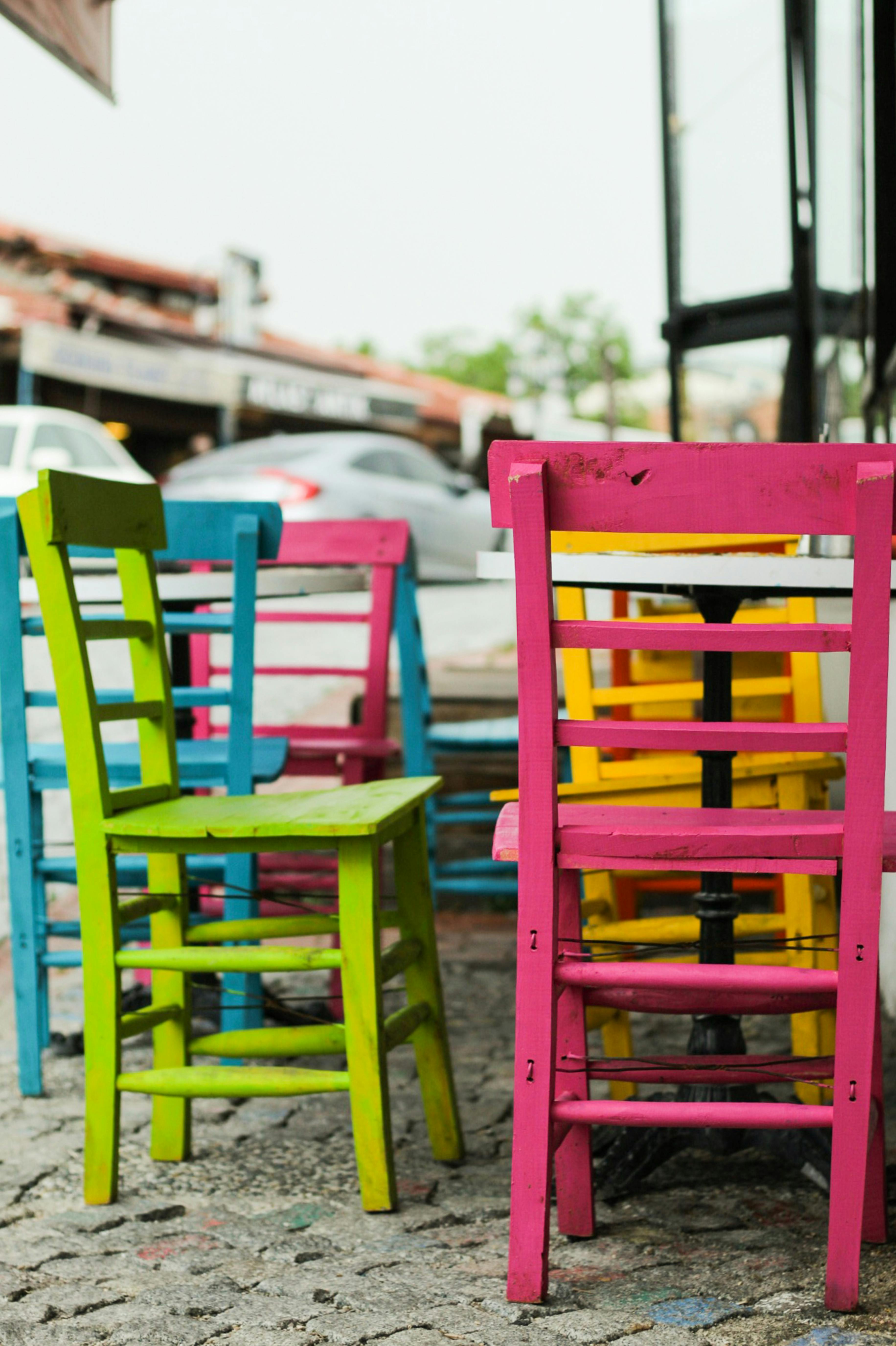 Colorful Wooden Chairs in Cafe Terrace · Free Stock Photo
