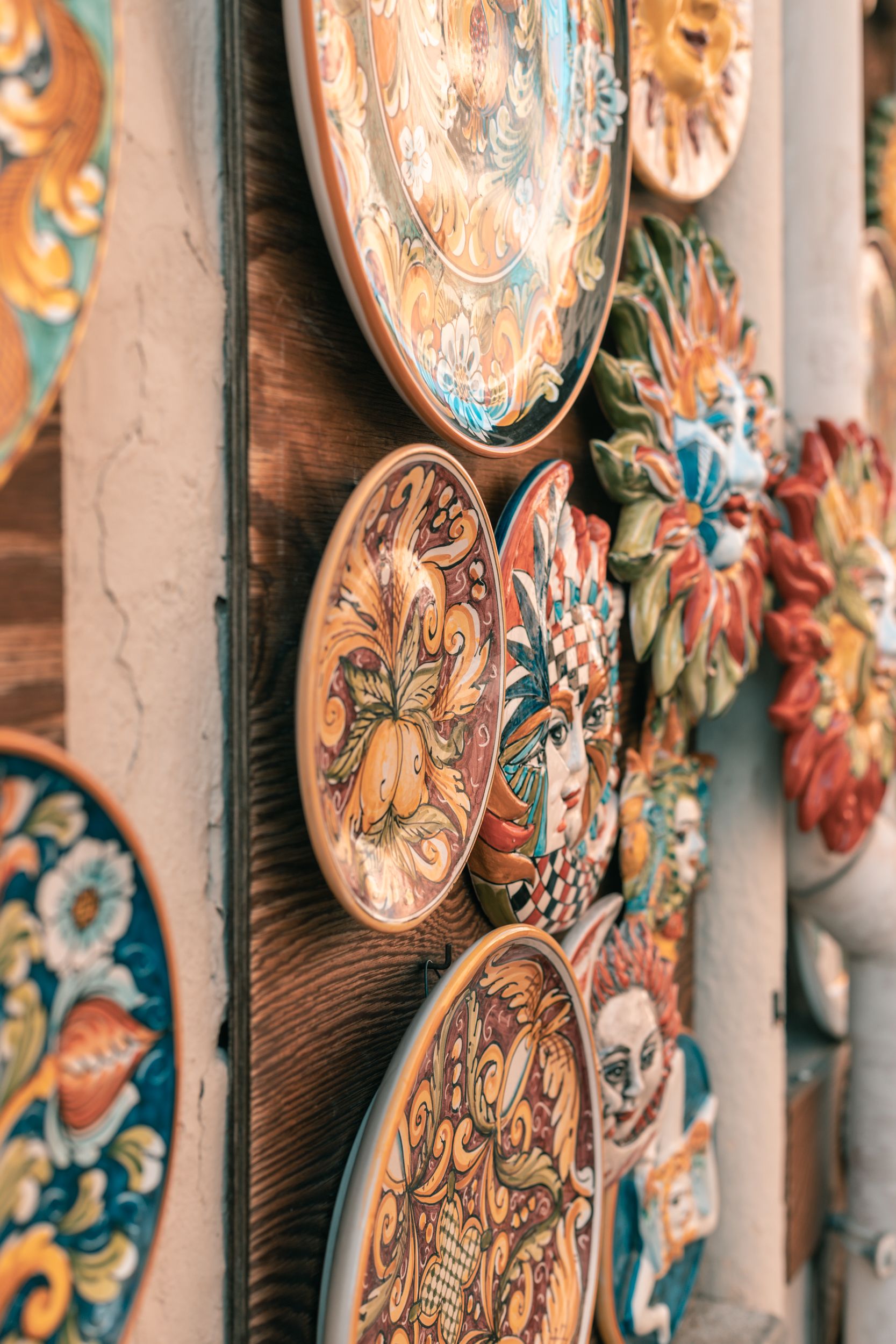 Traditional Decorated Plates Hanging on Wall · Free Stock Photo