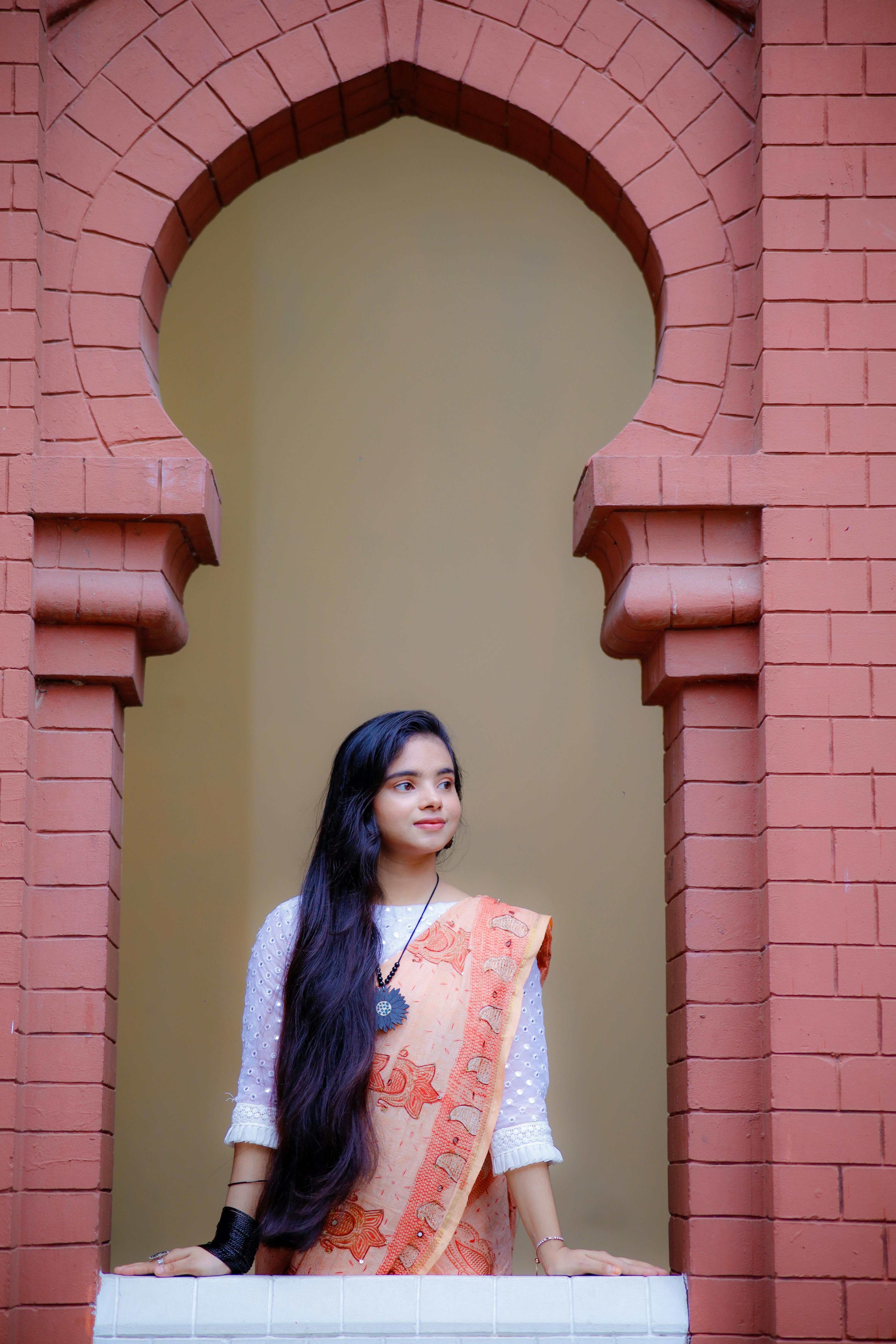 Young Woman Wearing a Traditional Indian Dress Saree · Free Stock Photo