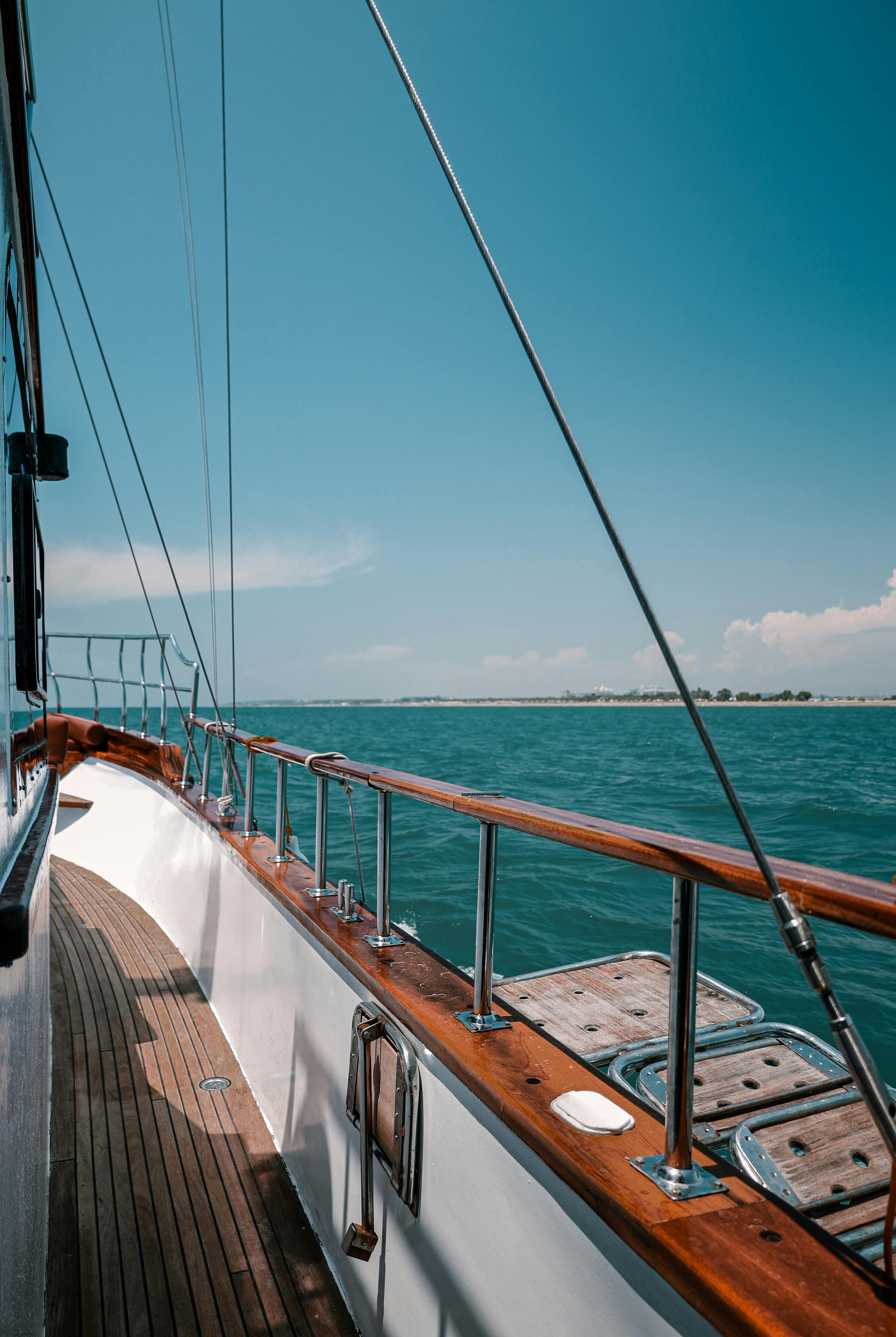 Railing on Vessel Sailing under Clear Sky · Free Stock Photo