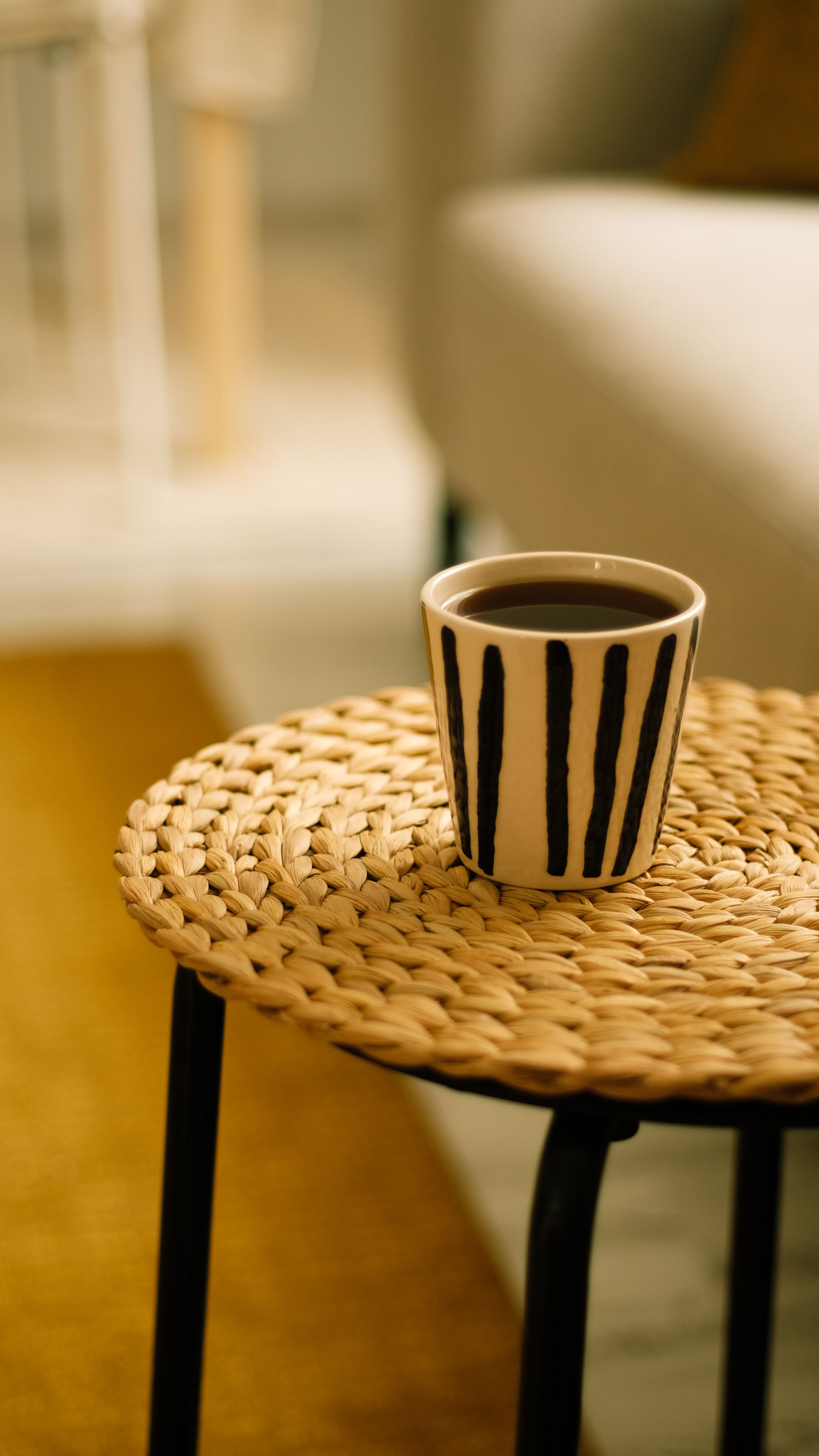 Coffee Cup on Wicker Table · Free Stock Photo