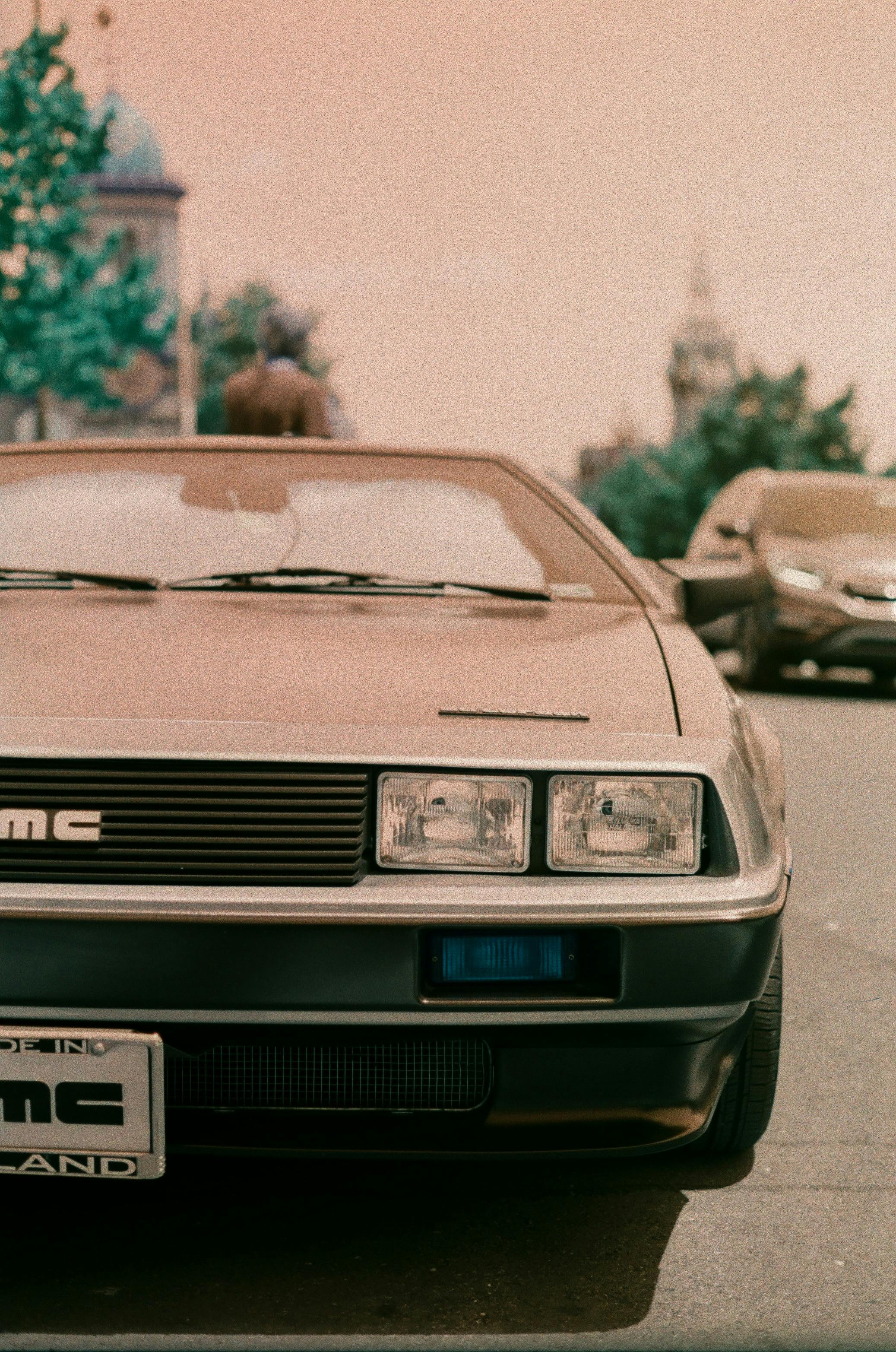 Beige Vintage Car on a Street · Free Stock Photo