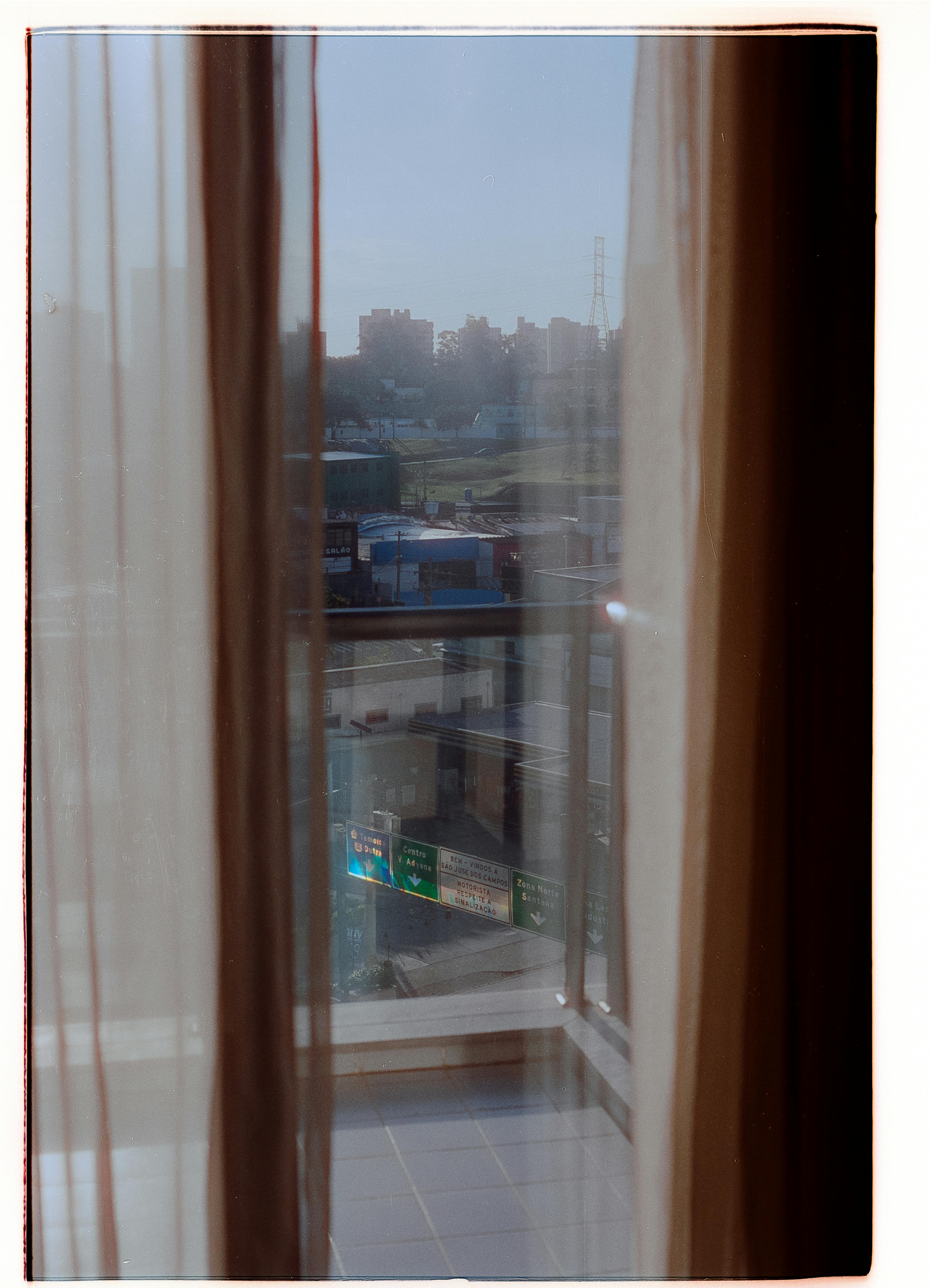 City Seen through Window · Free Stock Photo