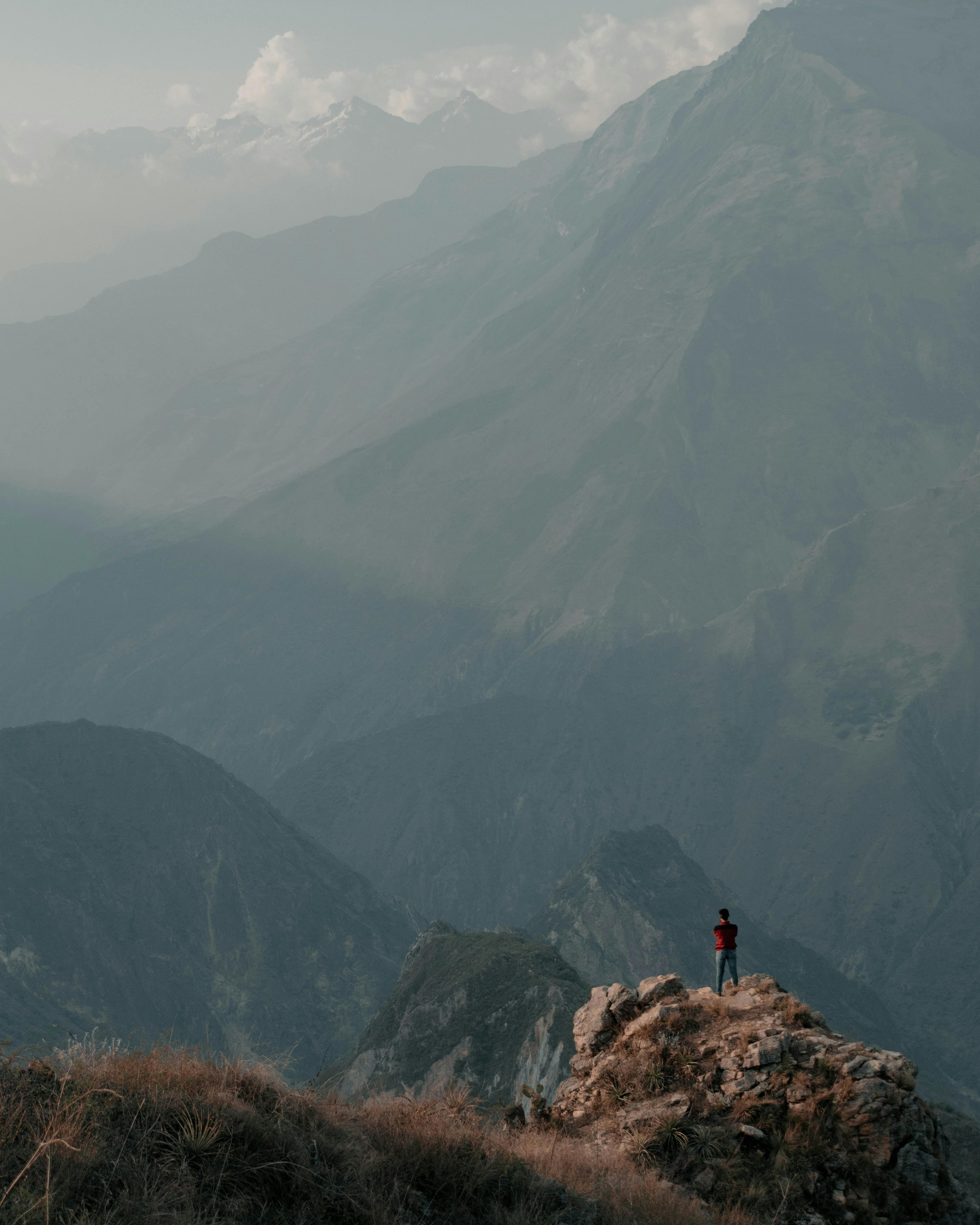 Person on Cliff · Free Stock Photo