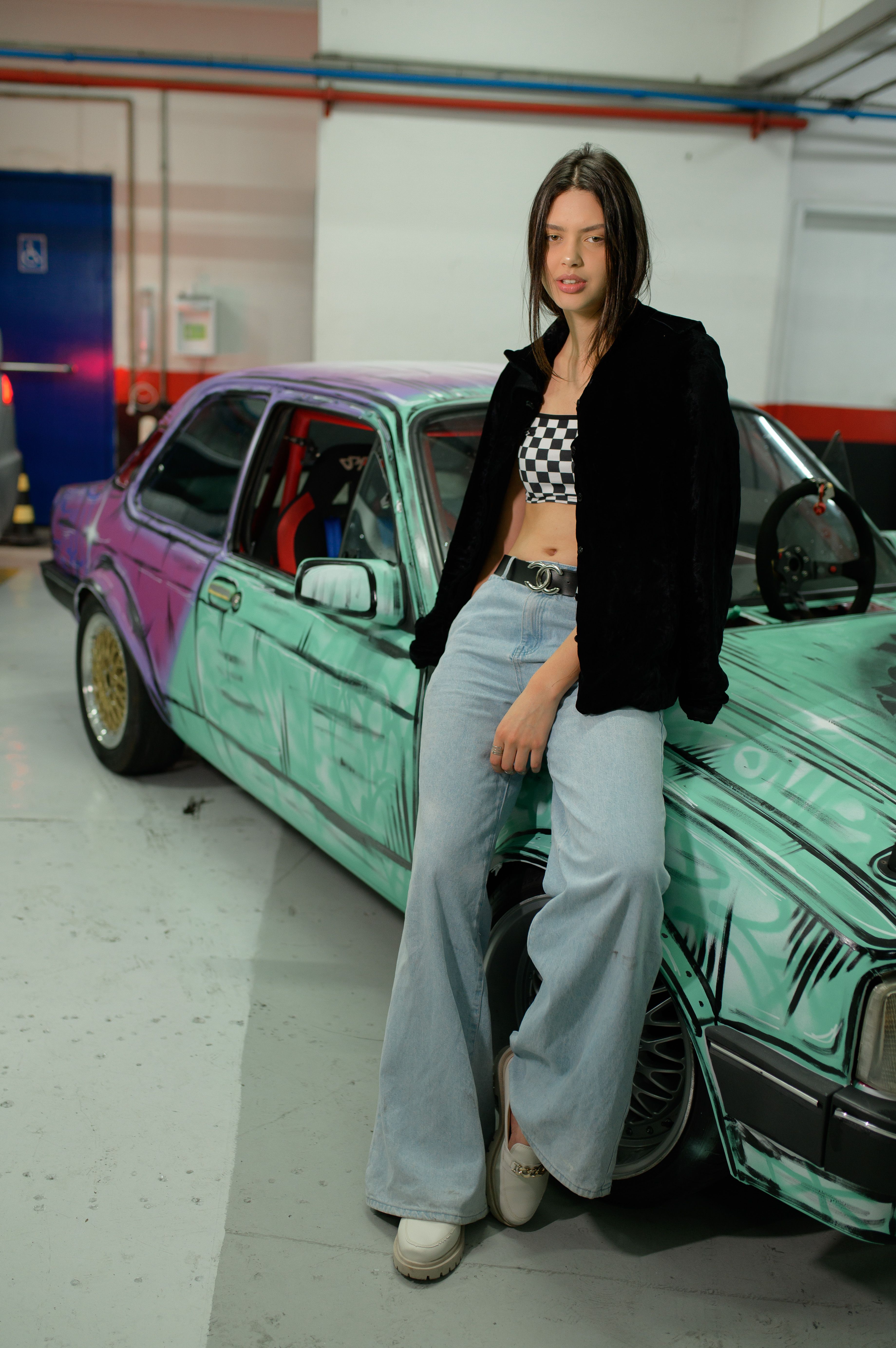 Beautiful Woman Leaning against a Car · Free Stock Photo