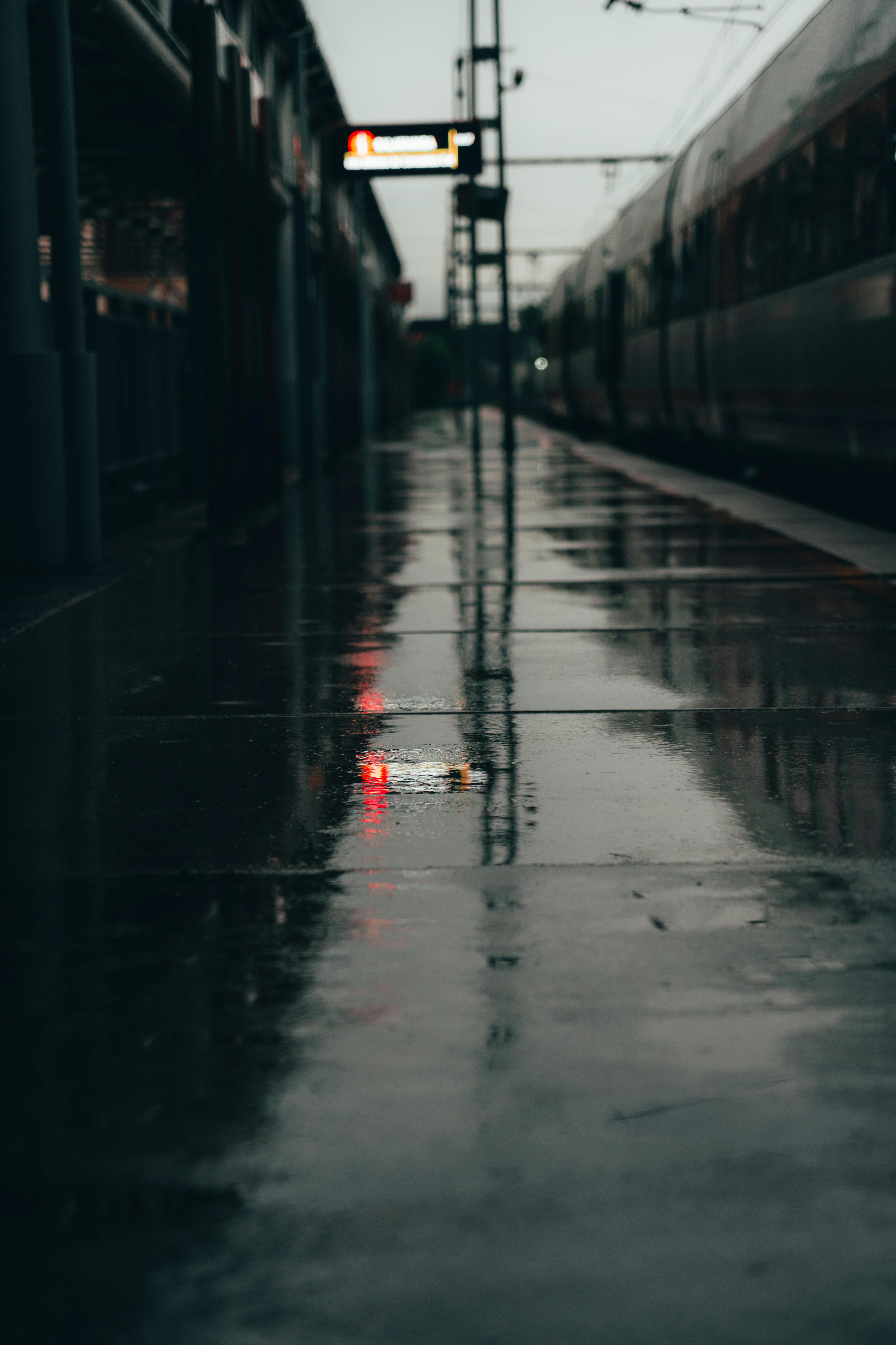 Railway Station Platform in Rain · Free Stock Photo