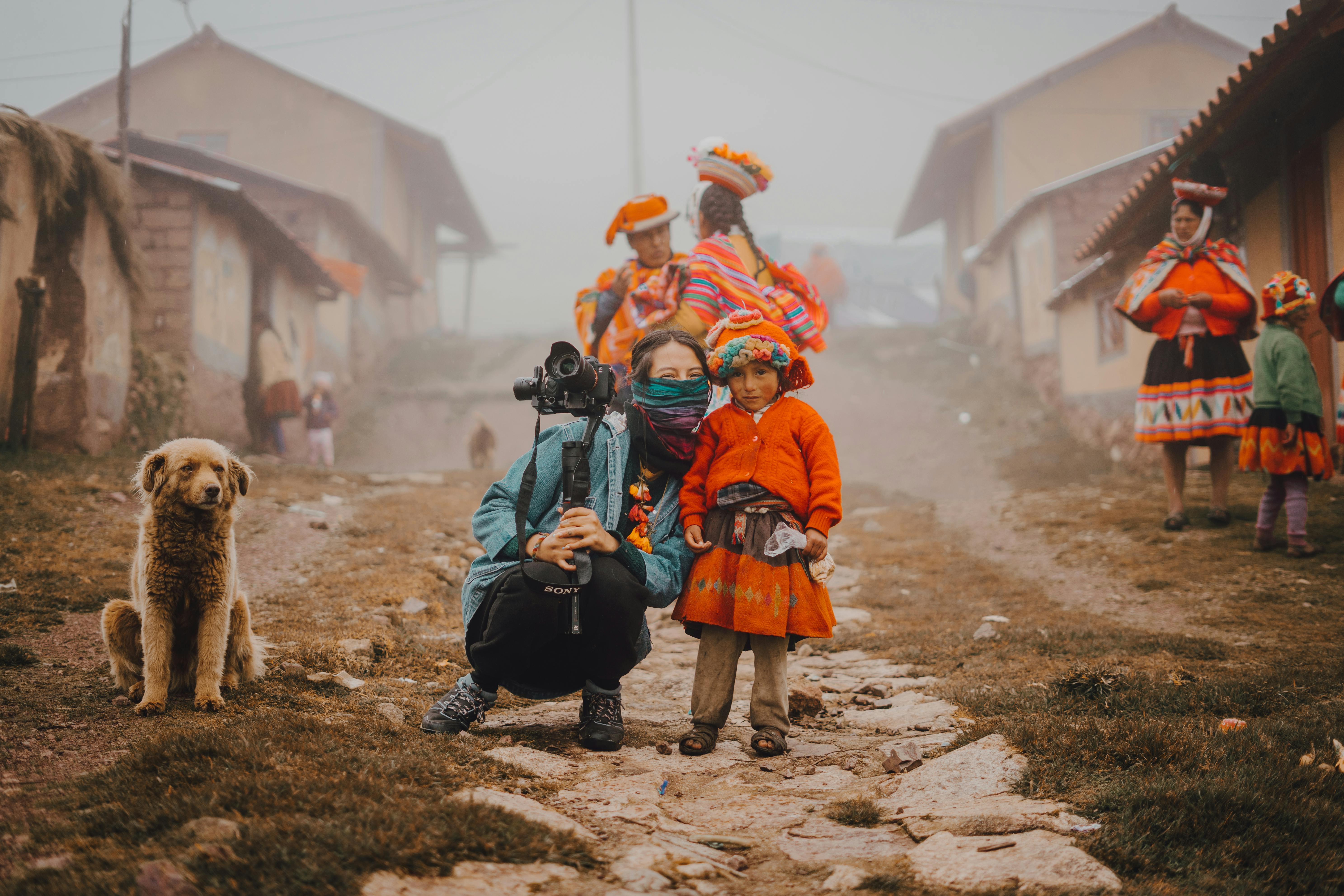 A Journalist Posing with Local People Wearing Traditional Clothing ...