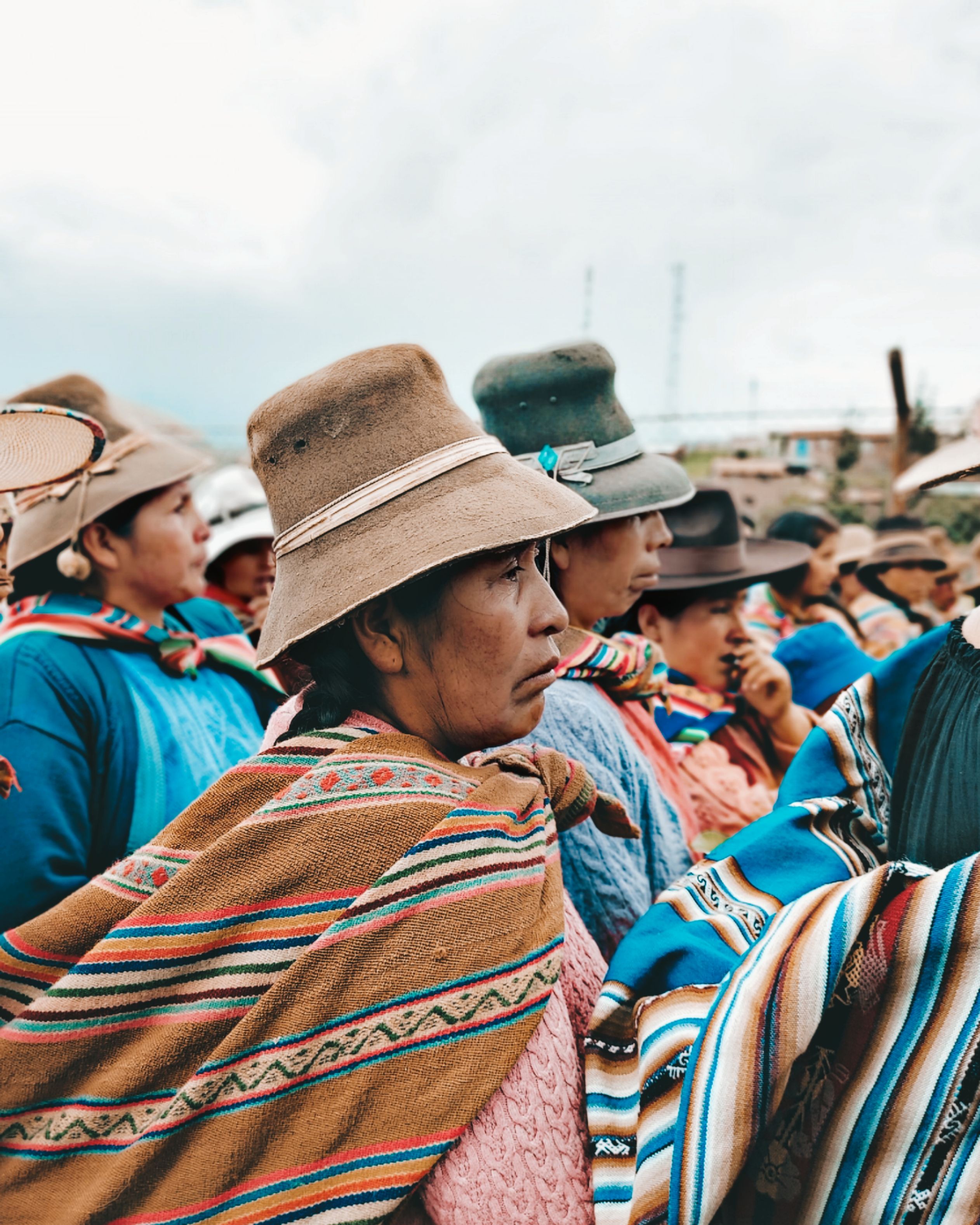 People in Traditional Clothing and Ponchos · Free Stock Photo