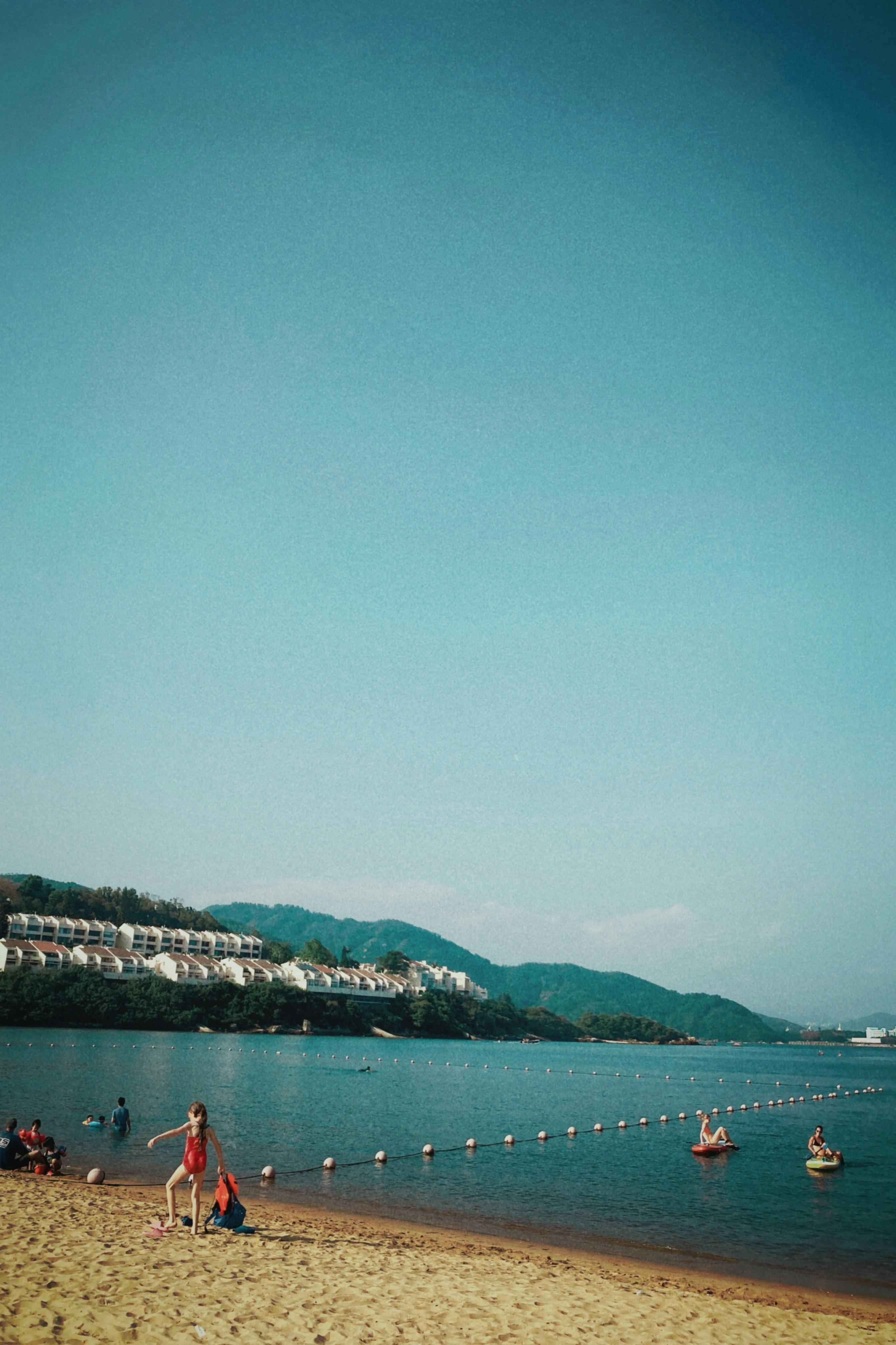 young girl treading on beach · Free Stock Photo