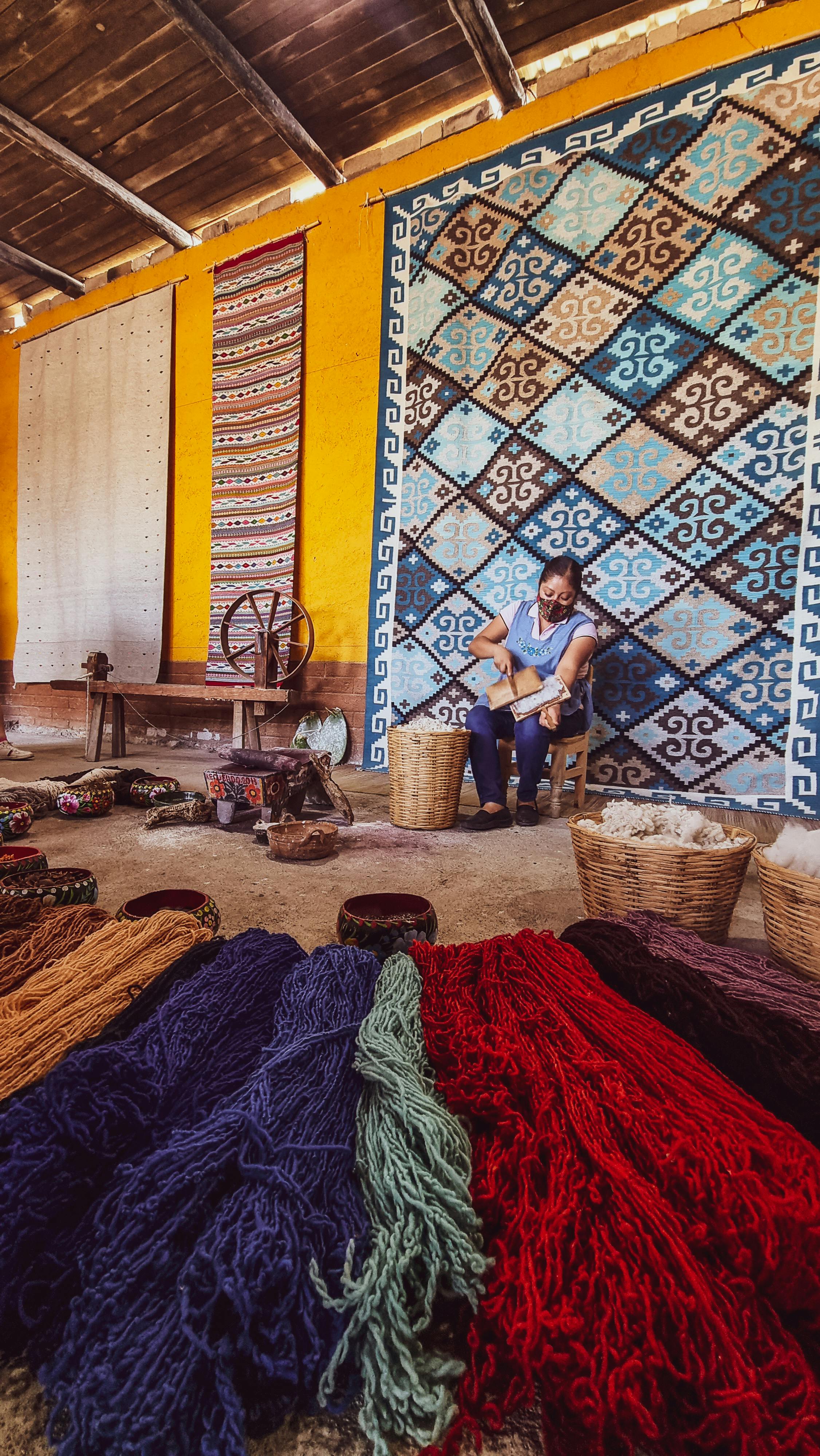 Woman Weaving with Colorful Threads · Free Stock Photo