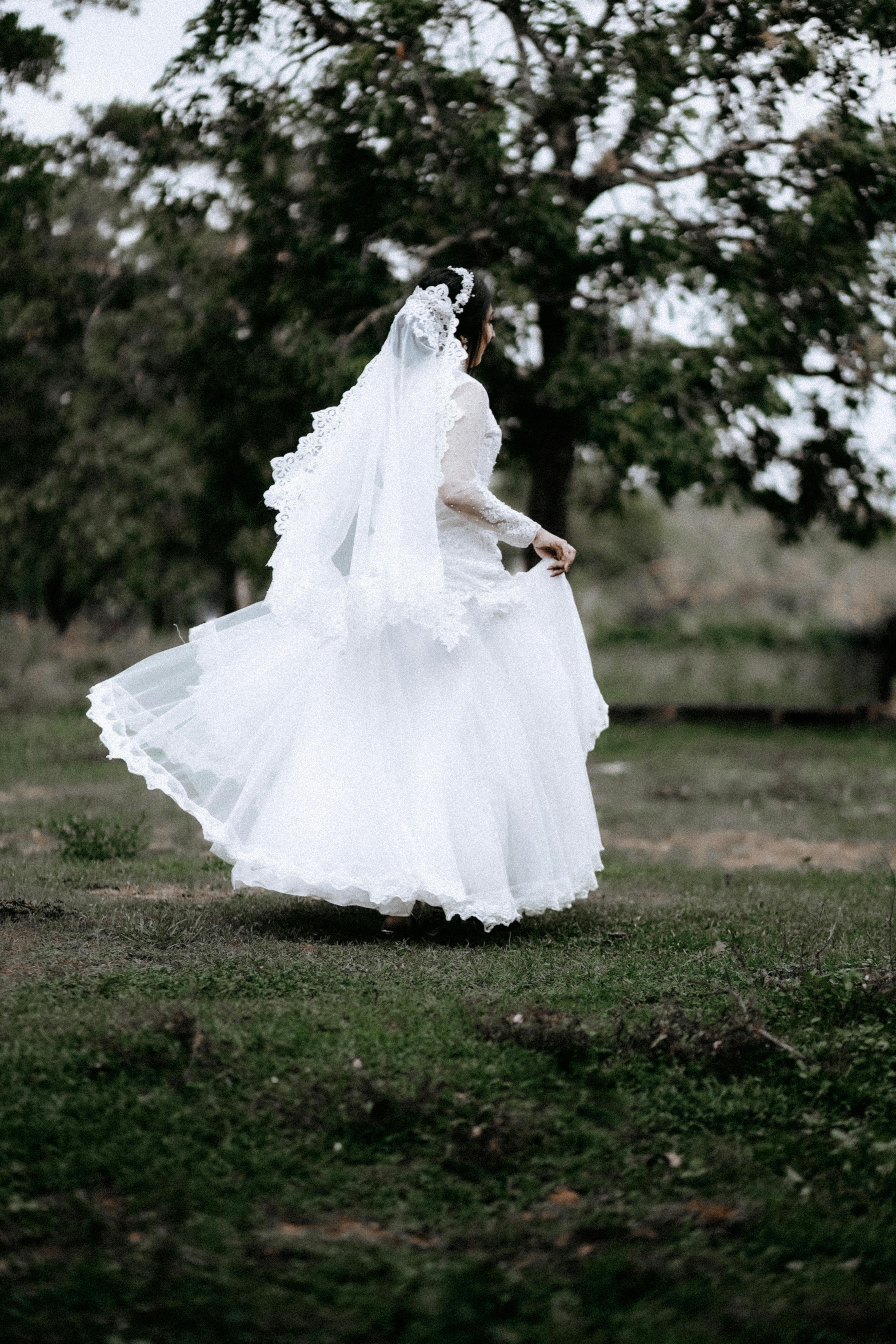 Woman in Dress on Meadow at Sunset · Free Stock Photo