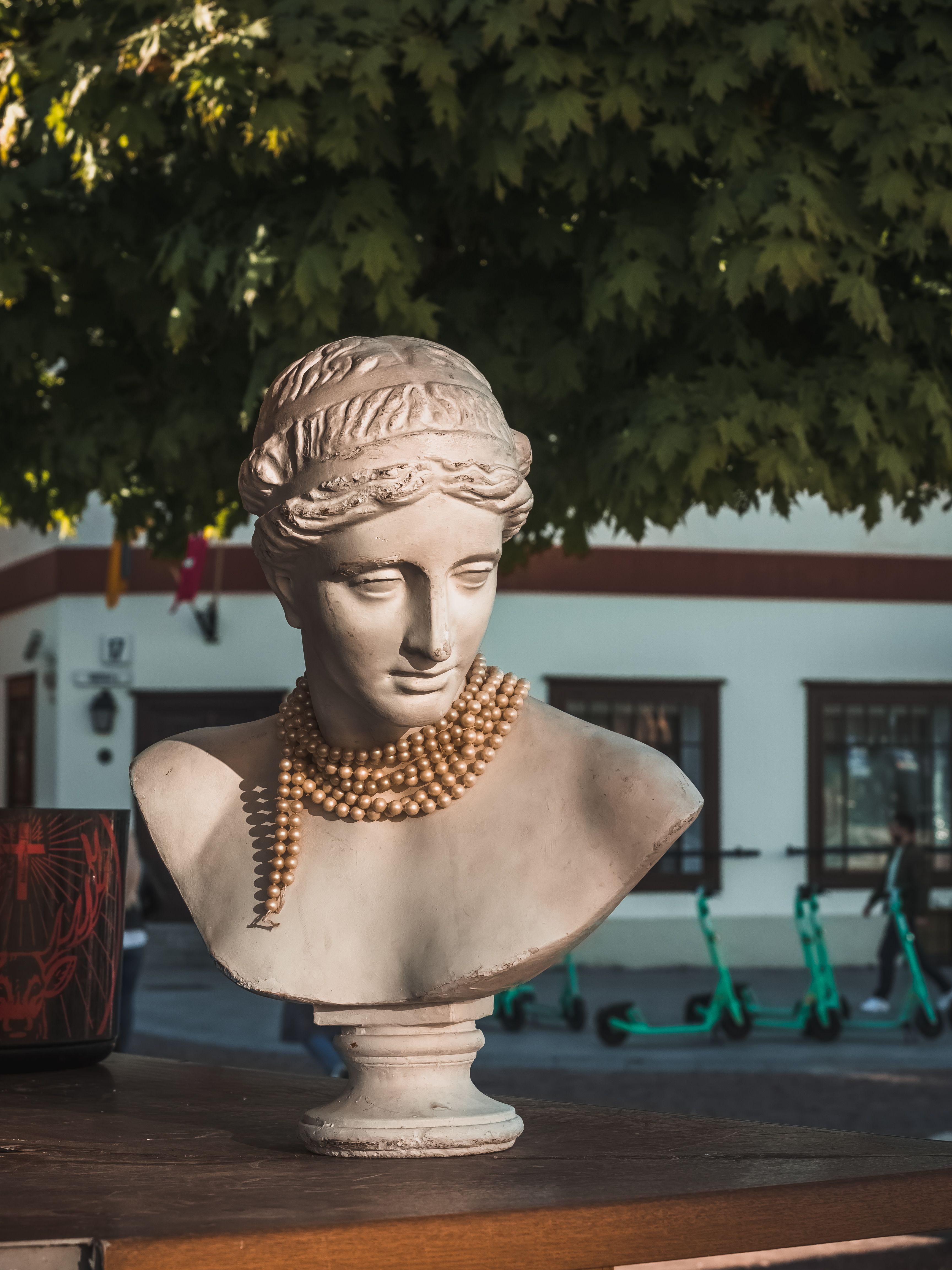 Classical Sculpture on the Counter in a Park · Free Stock Photo