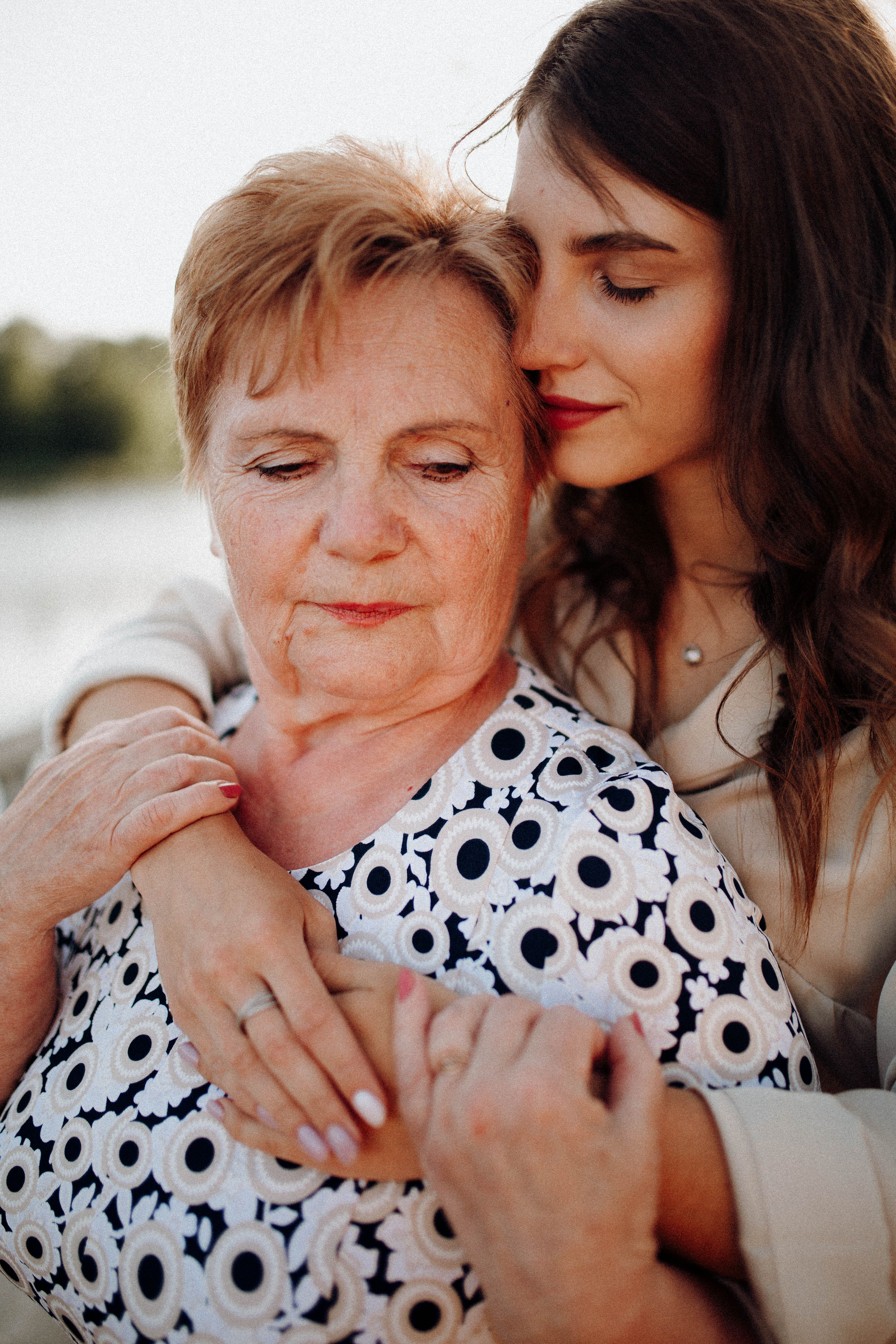 Young Woman Embracing Her Mother · Free Stock Photo