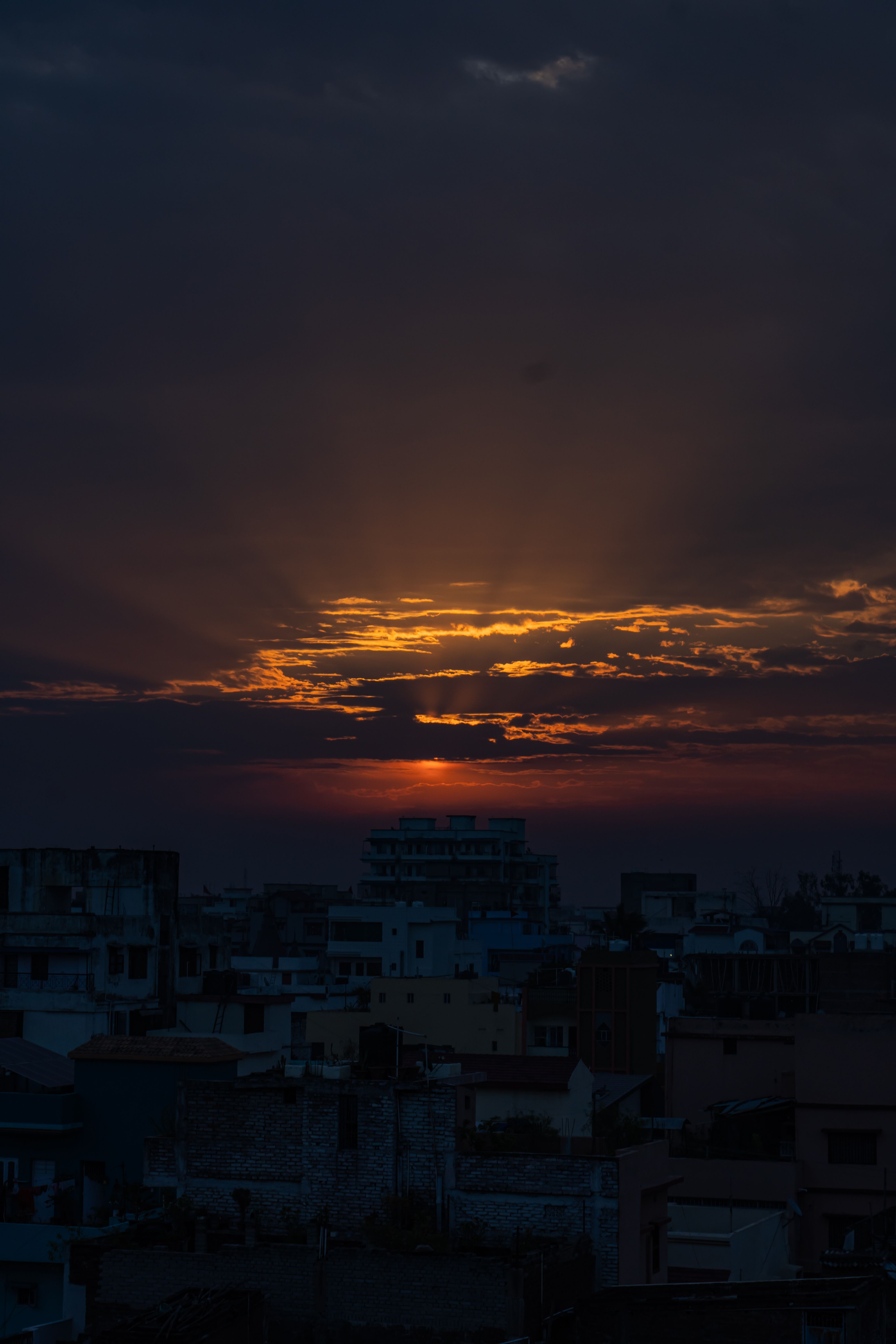 Clouds over Town at Sunset · Free Stock Photo