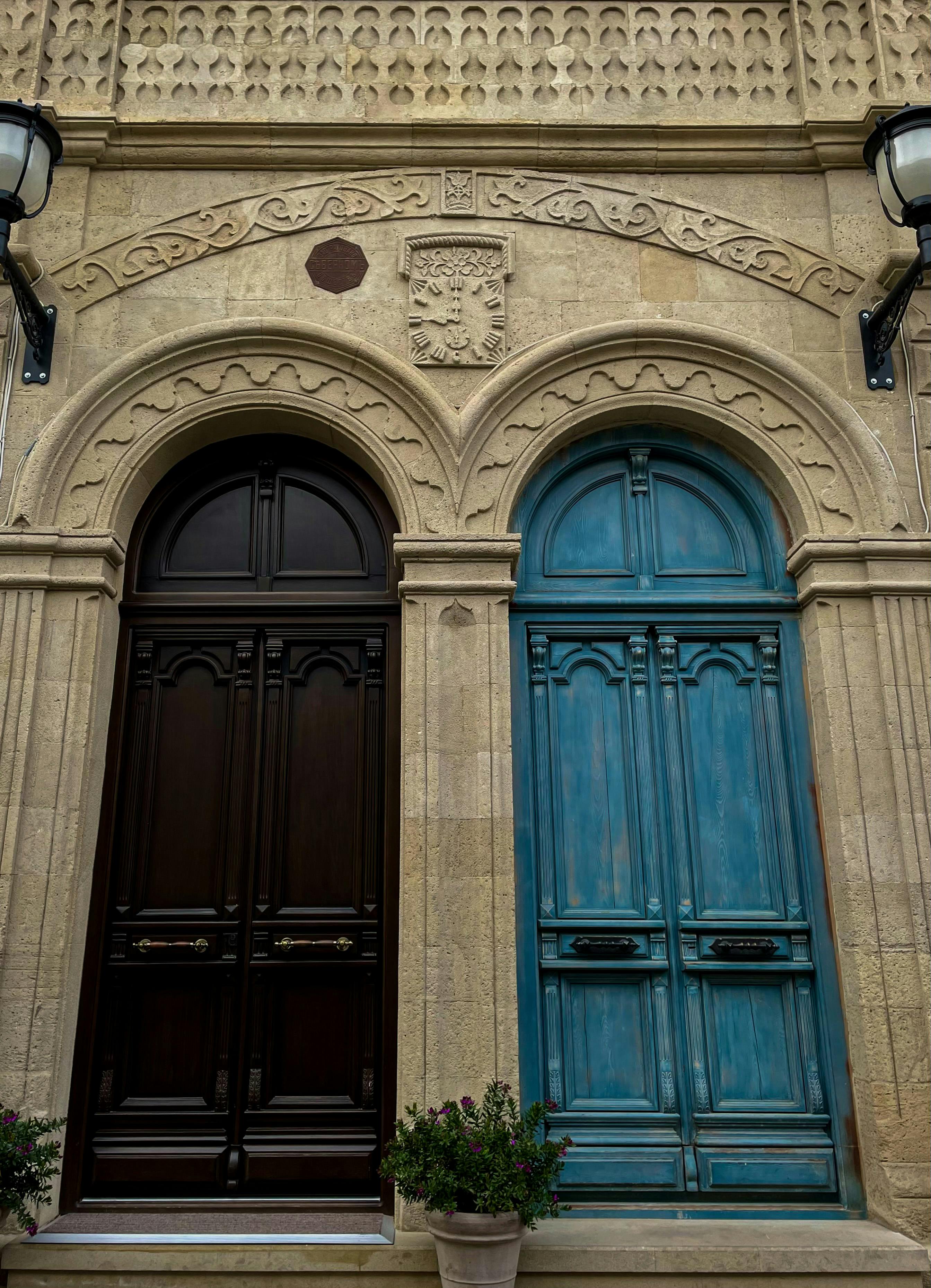 Black and Blue Doors in Building · Free Stock Photo