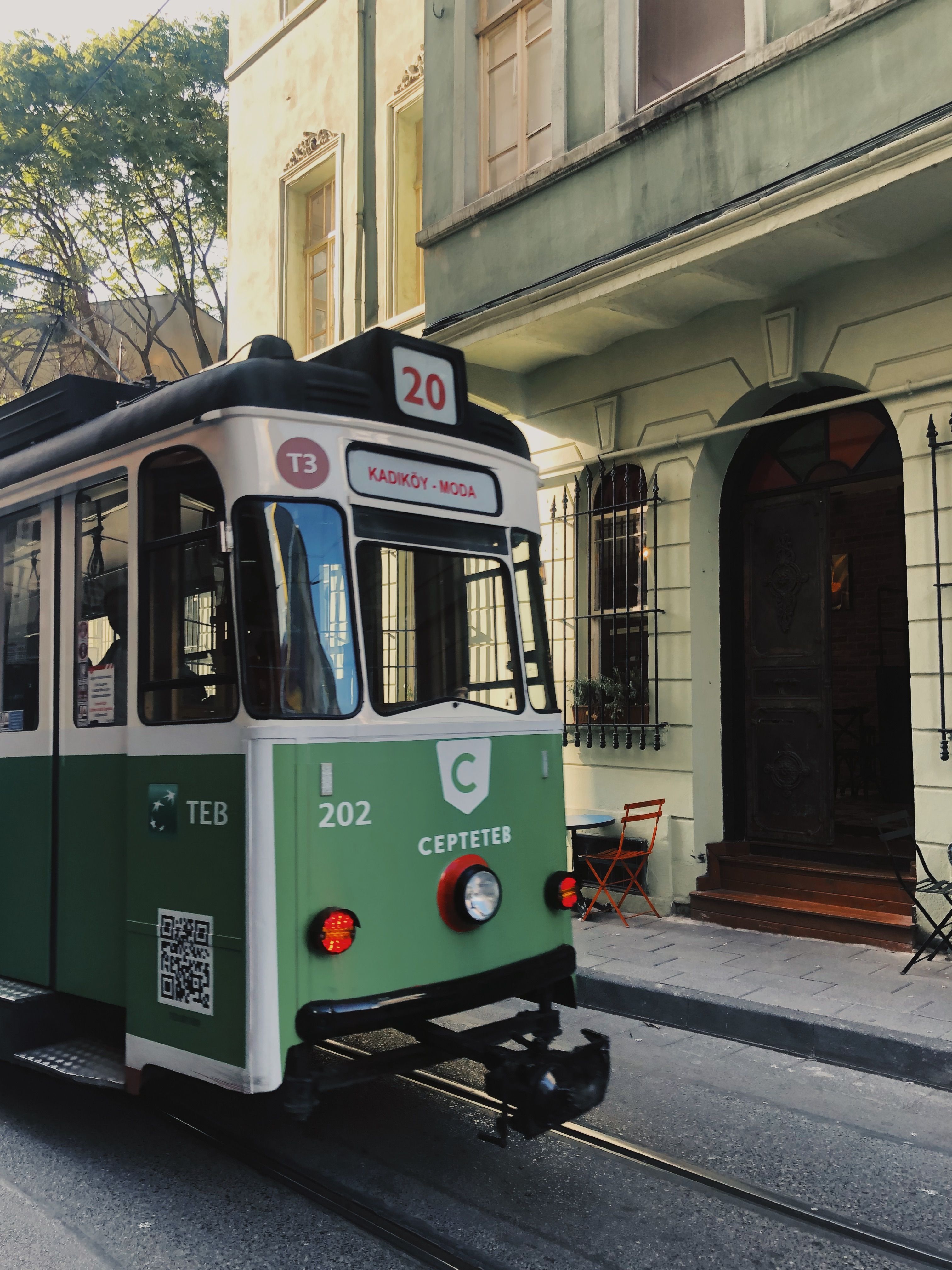 Old Tram Driving through City Street · Free Stock Photo
