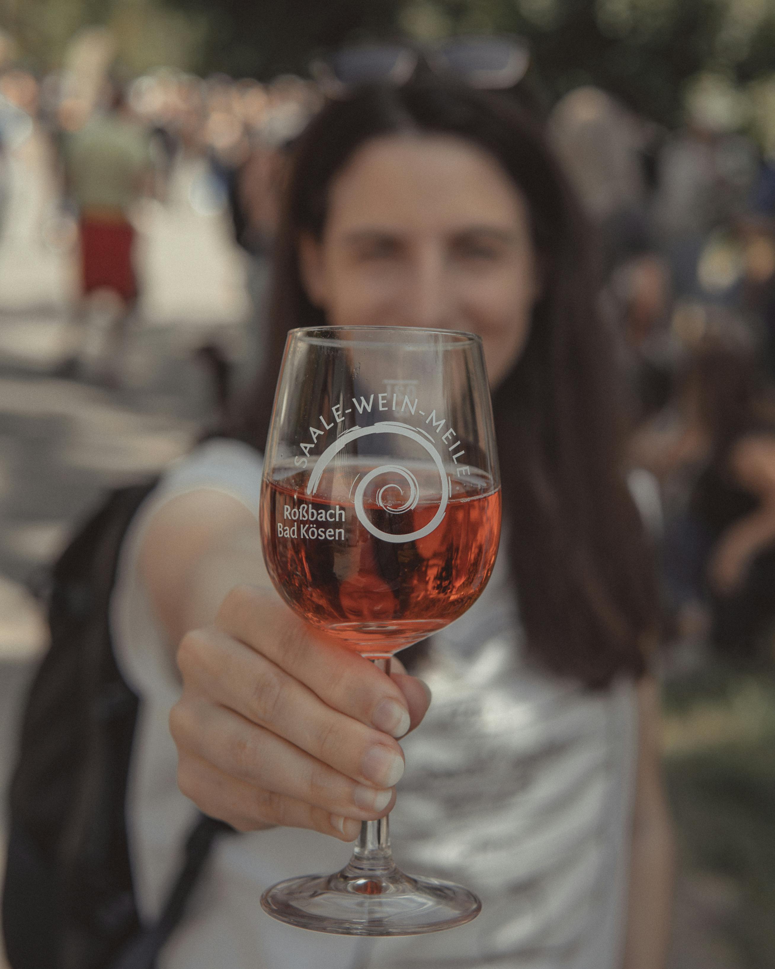 Woman Drinking Red Wine From a Wineglass · Free Stock Photo