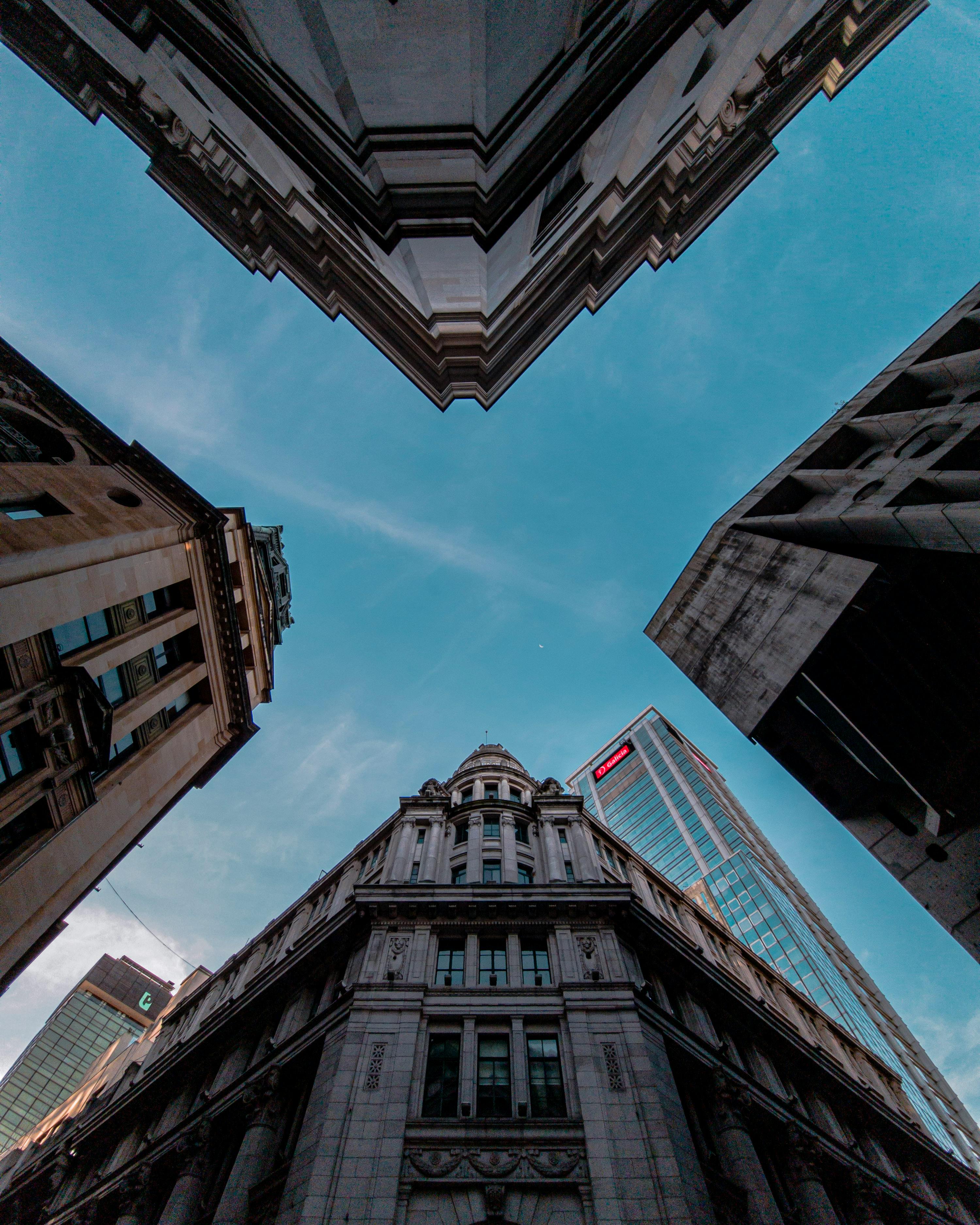 Photographing City Buildings with a Smartphone · Free Stock Photo