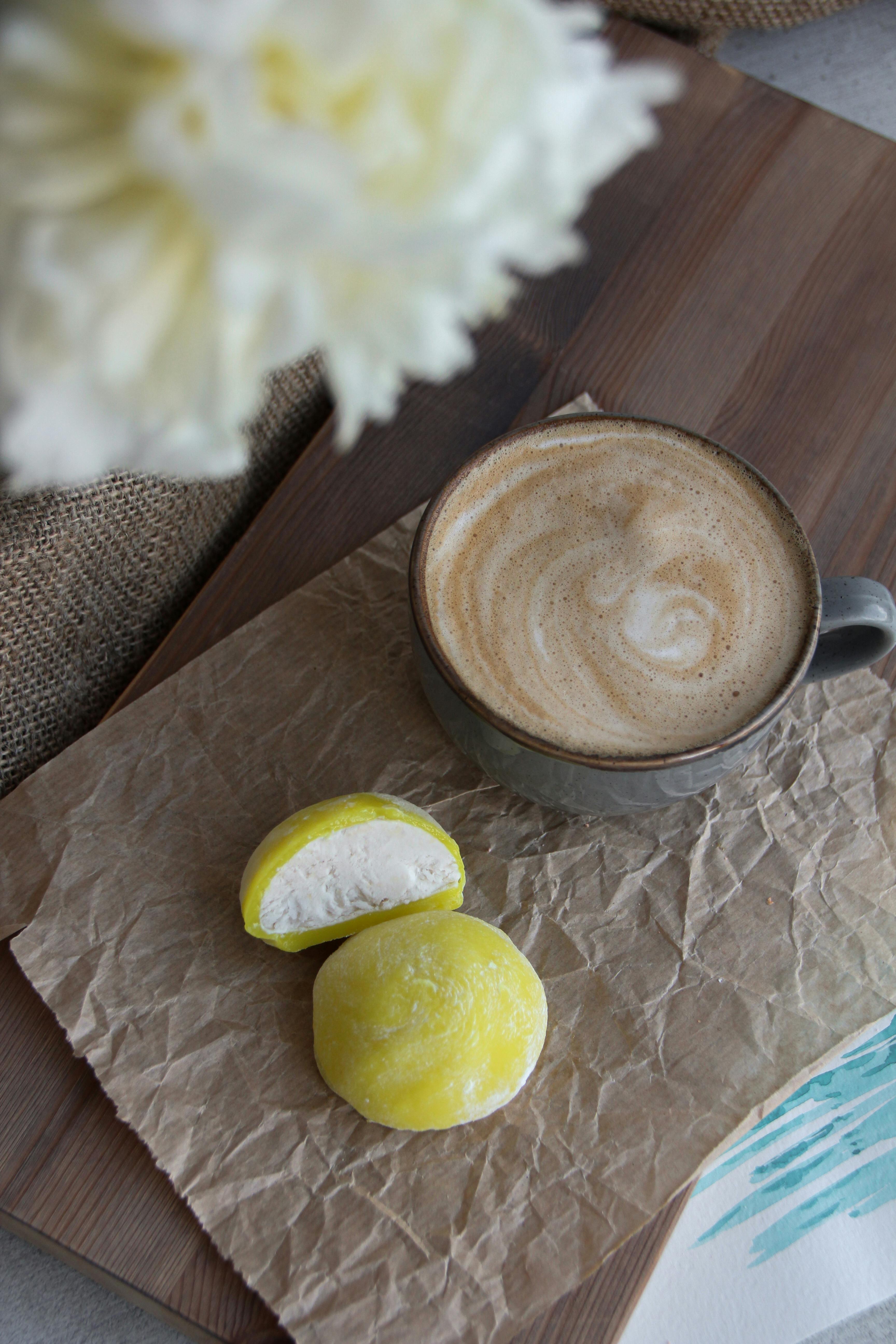 A Coffee Cup and a Mochi · Free Stock Photo