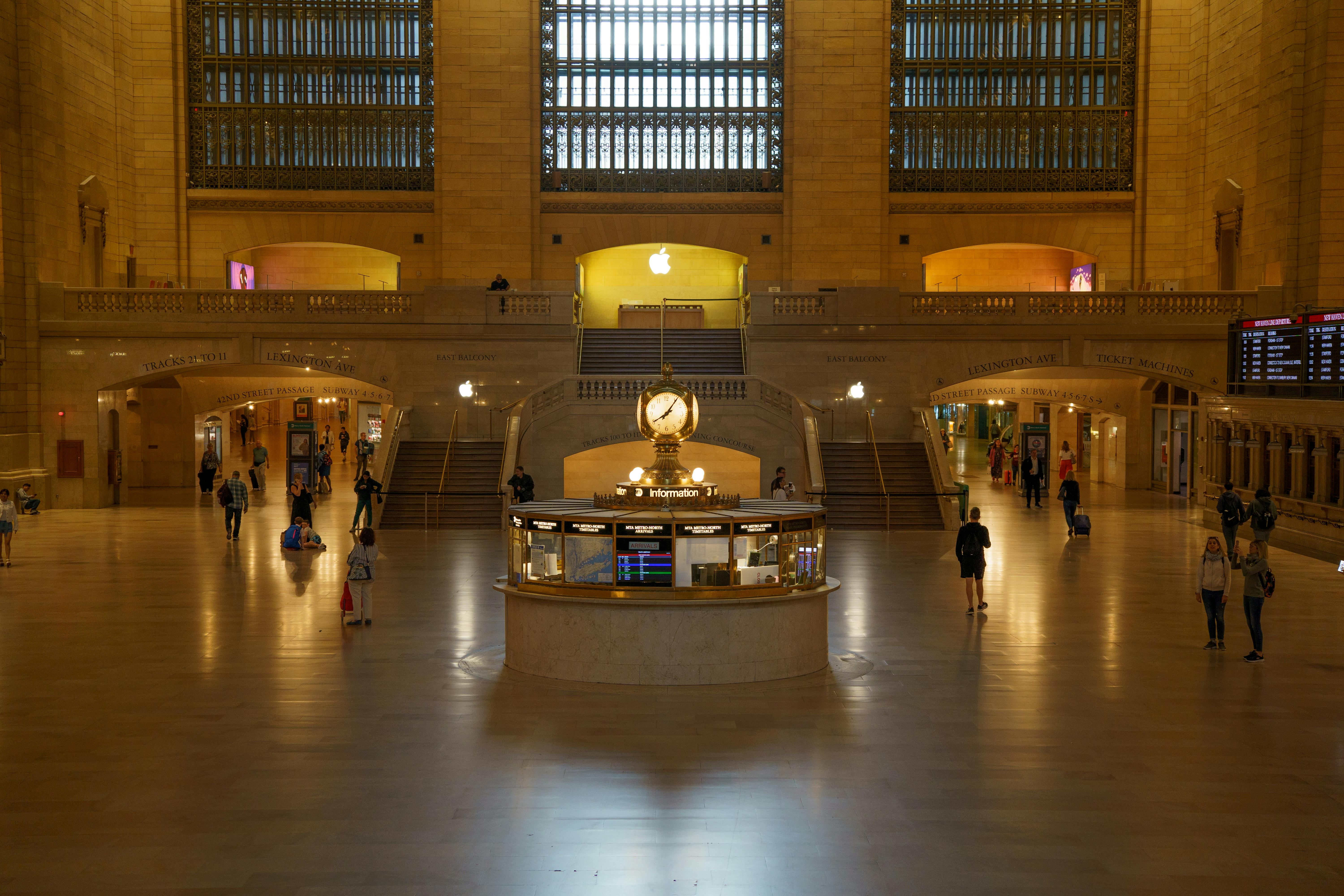 Interior of arched passage in railway terminal with chandeliers · Free ...