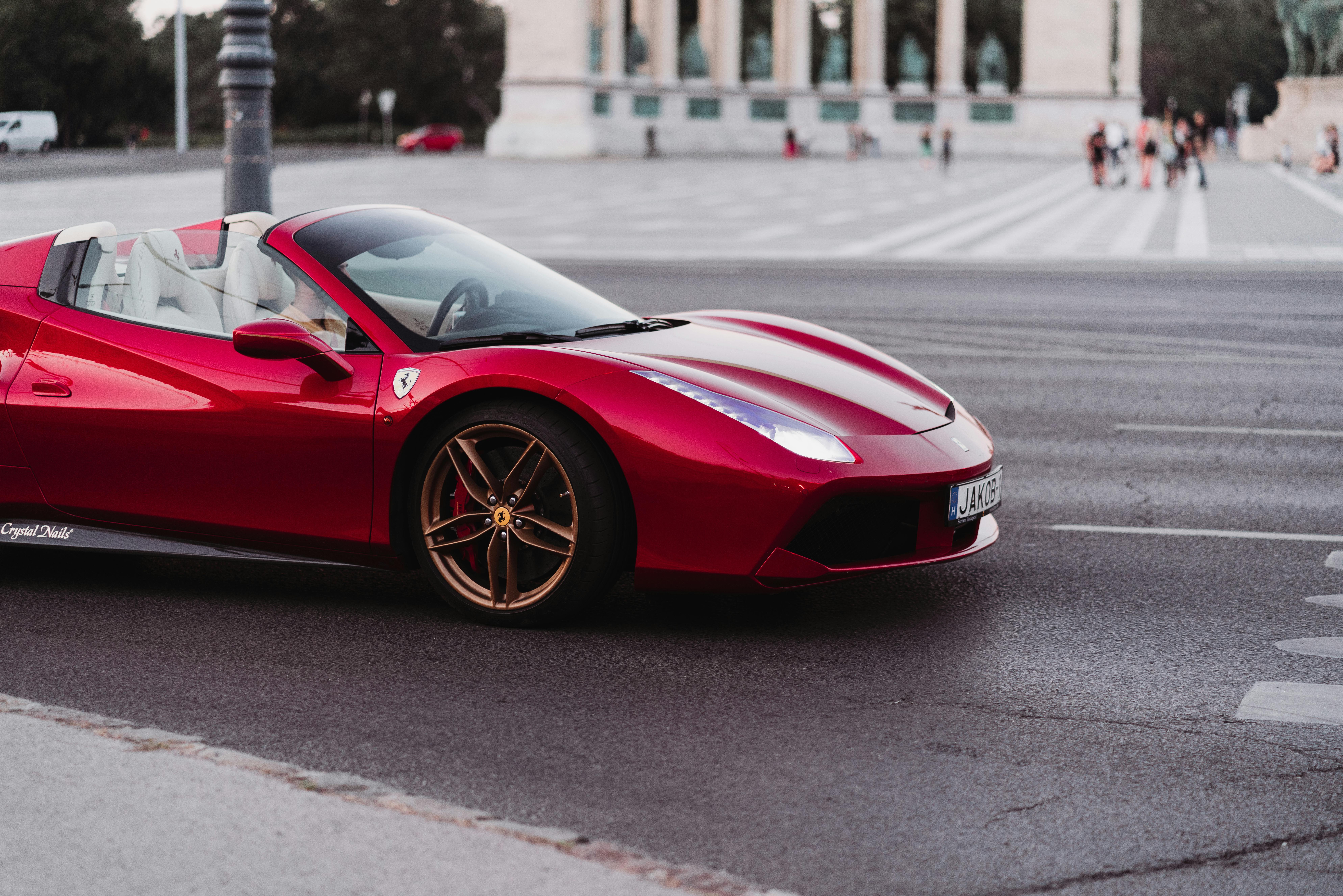 Red Ferrari on the Road · Free Stock Photo