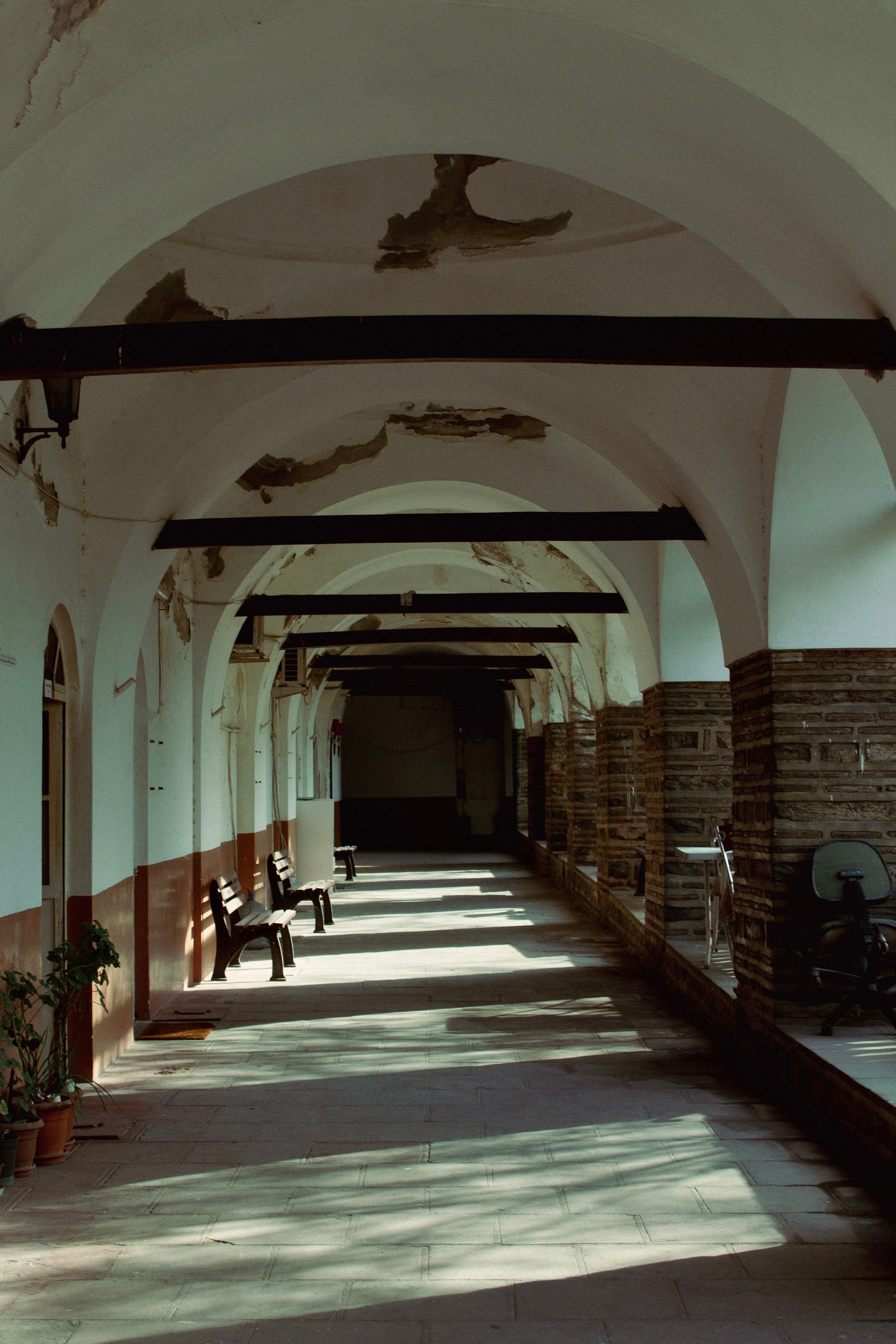 Beams under Arches over Pavement · Free Stock Photo